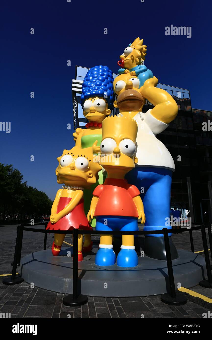 Model figures of The Simpsons are on display in front of The Simpsons ...