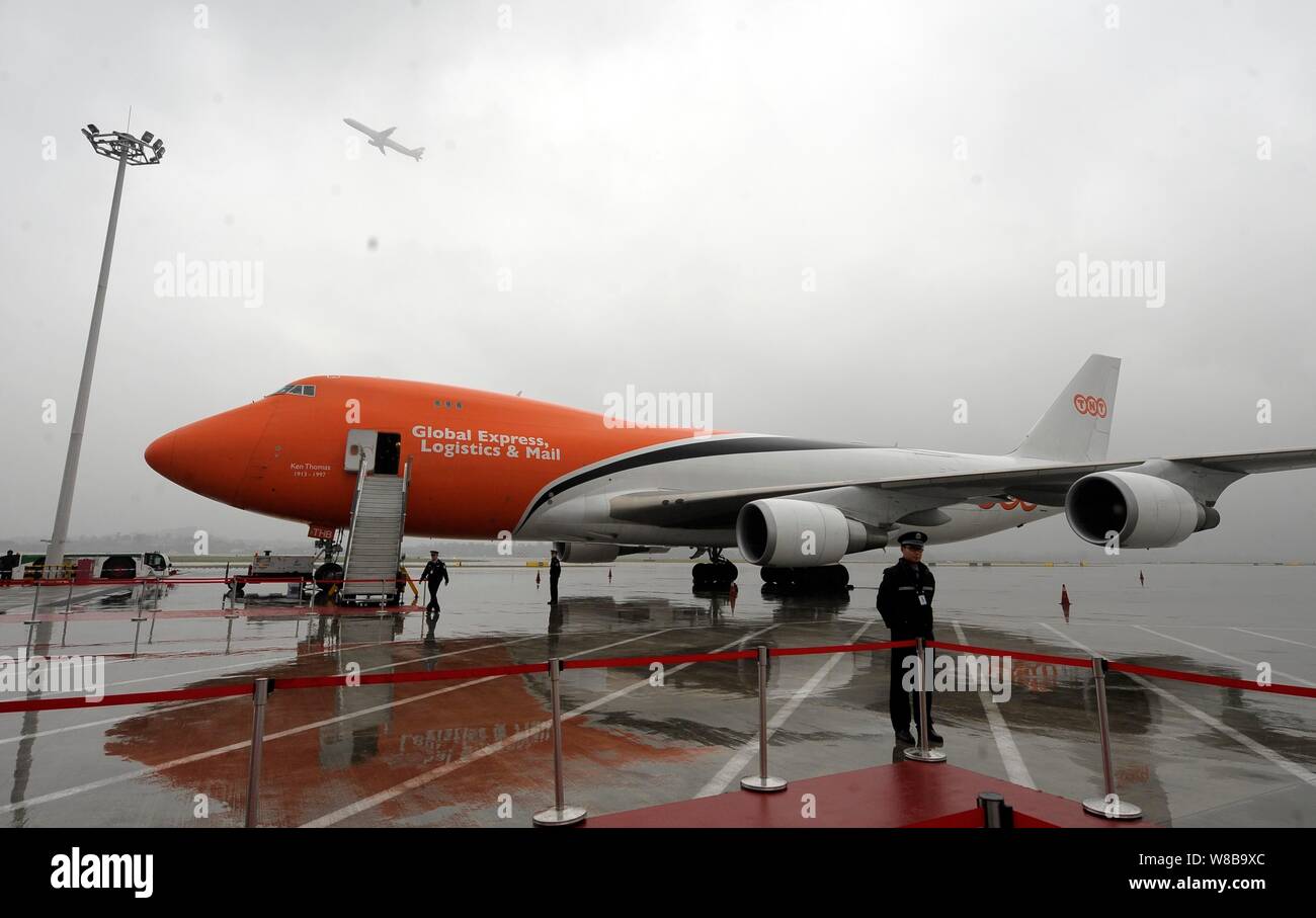--FILE--A plane of TNT Express is pictured at the Chongqing Jiangbei ...
