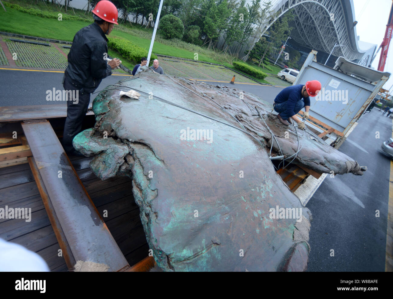 Chinese workers remove tightwire from the world's largest piece of ...