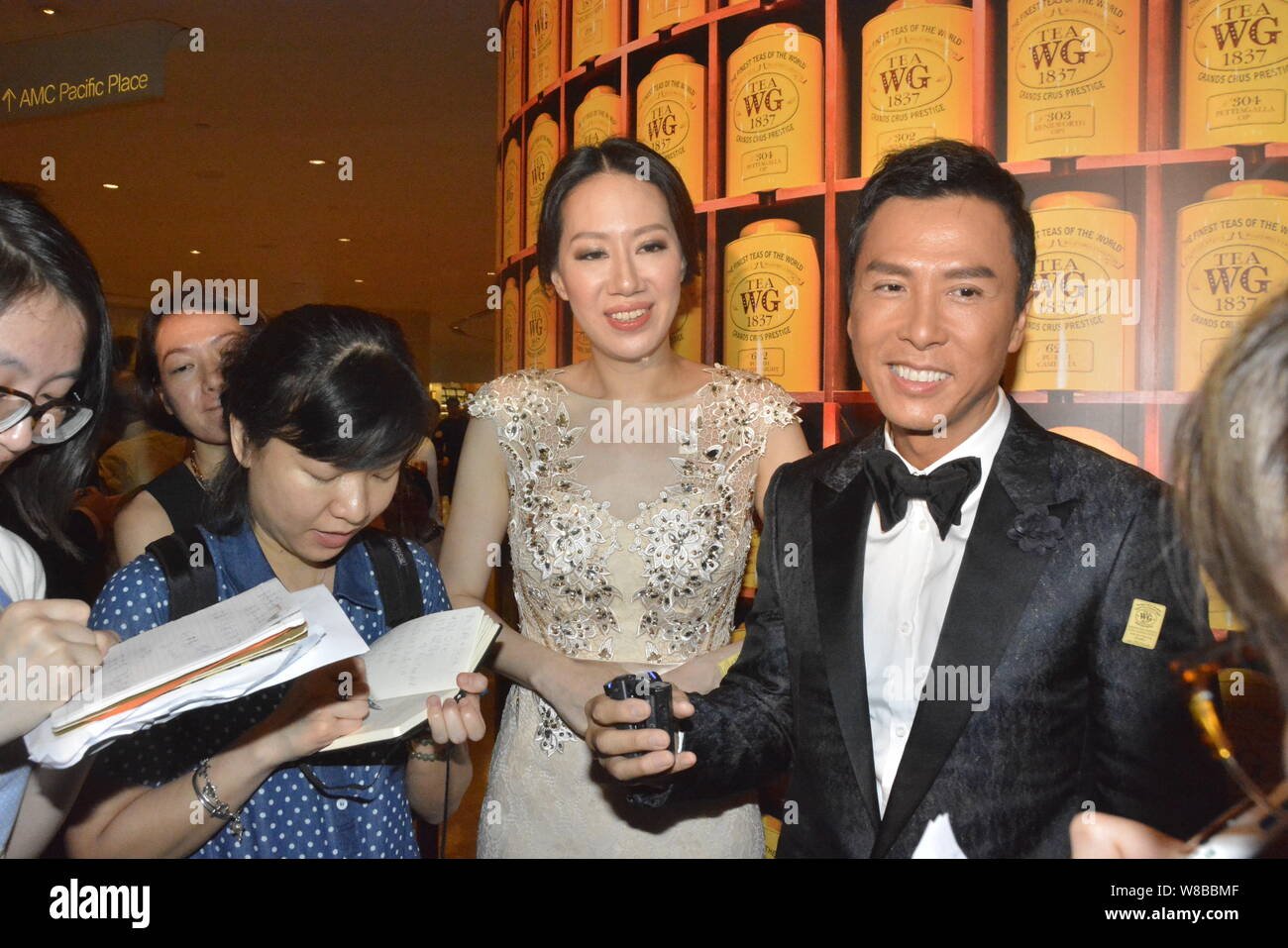Hong Kong actor Donnie Yen, right, and his model wife Cecilia Wang are ...