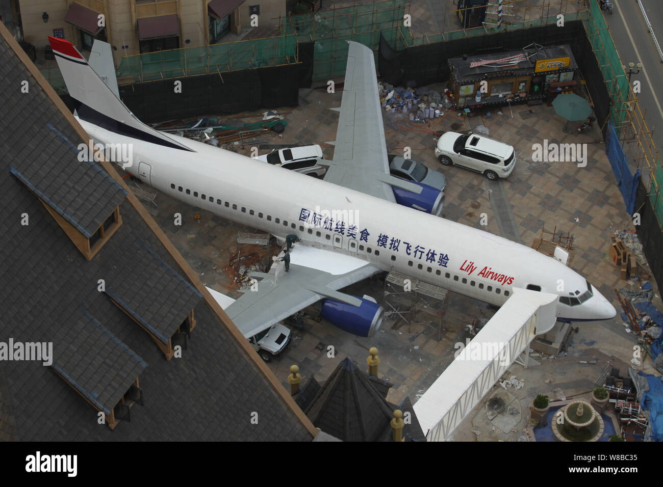 Aerial view of a retired Boeing 737 passenger jet of Batavia Air being ...