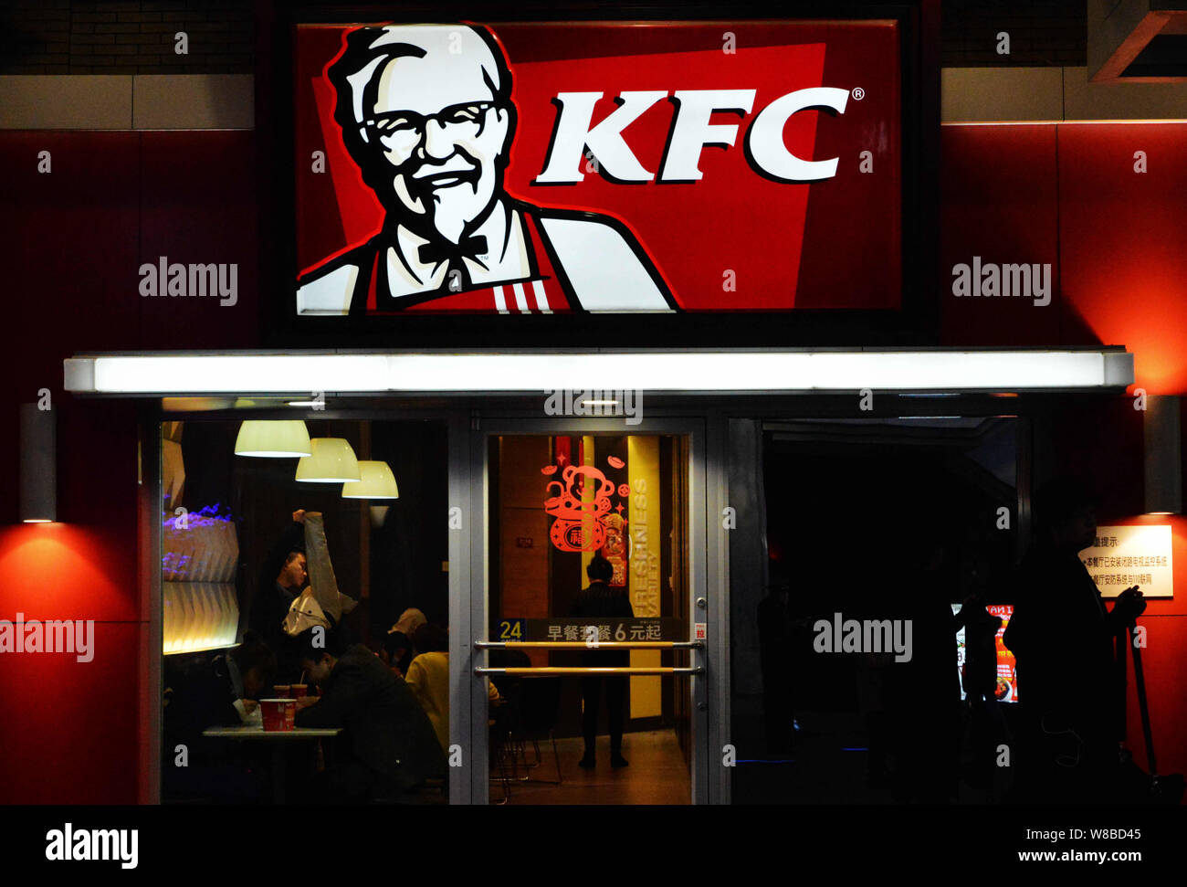 --FILE--Customers eat food at a fastfood restaurant of KFC of Yum ...