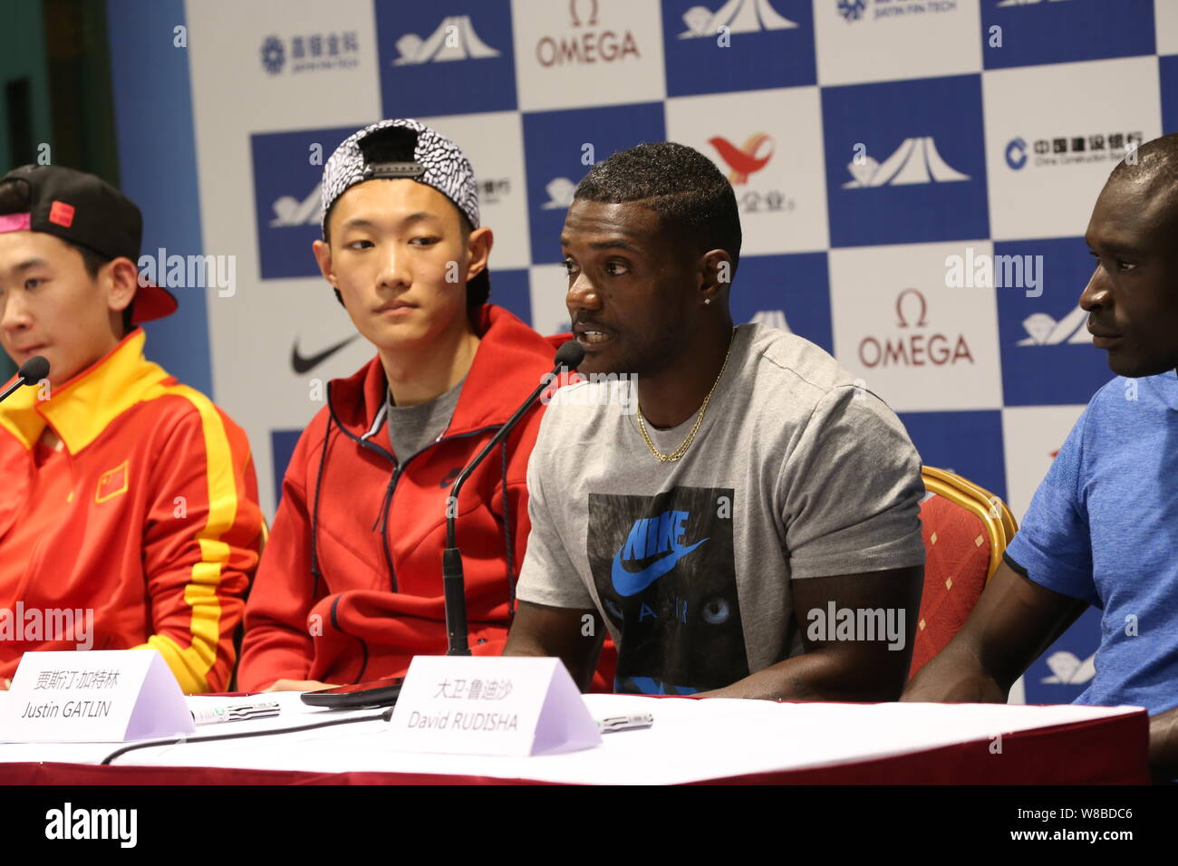 (From left) Chinese long jumpers Huang Changzhou and Wang Jianan ...