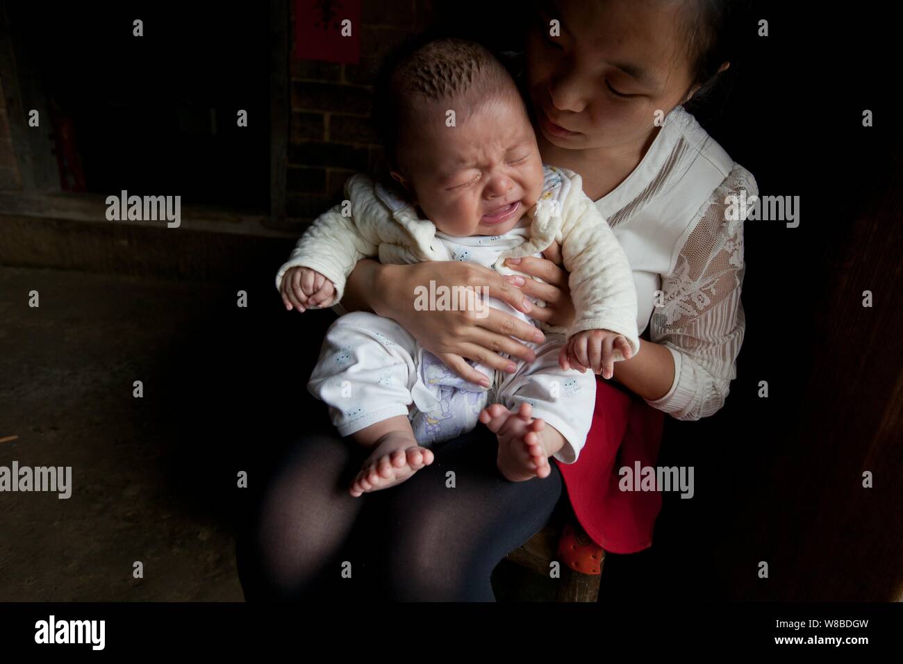 The three-month-old baby boy Hong Hong who has 15 fingers and 16 toes ...