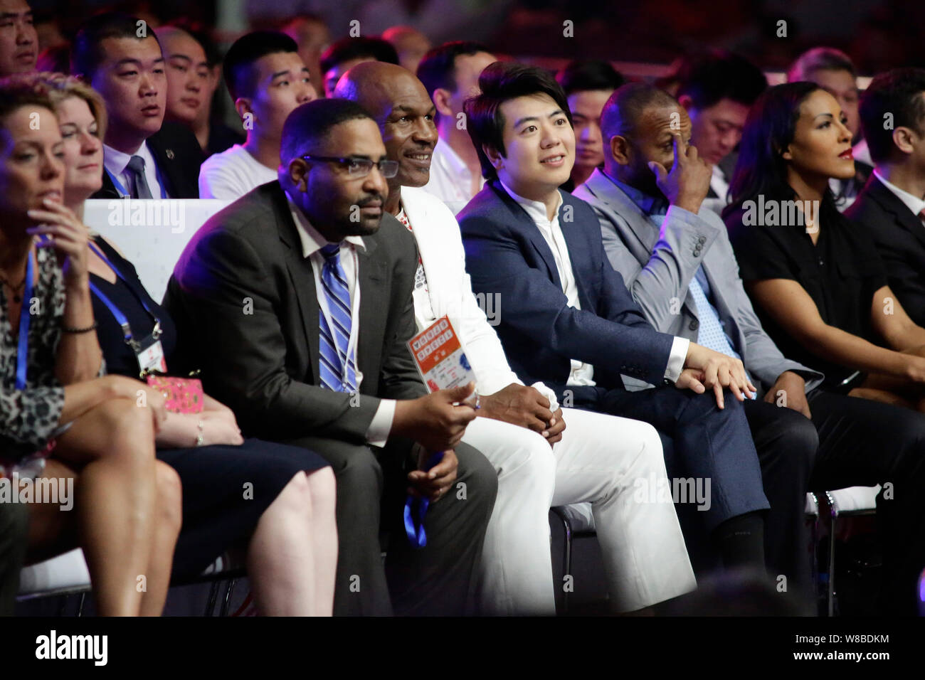American boxer Mike Tyson, third left, and Chinese pianist Lang Lang ...