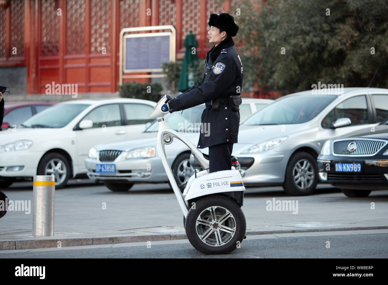 --FILE--A Chinese police officer rides a self-balancing electric ...