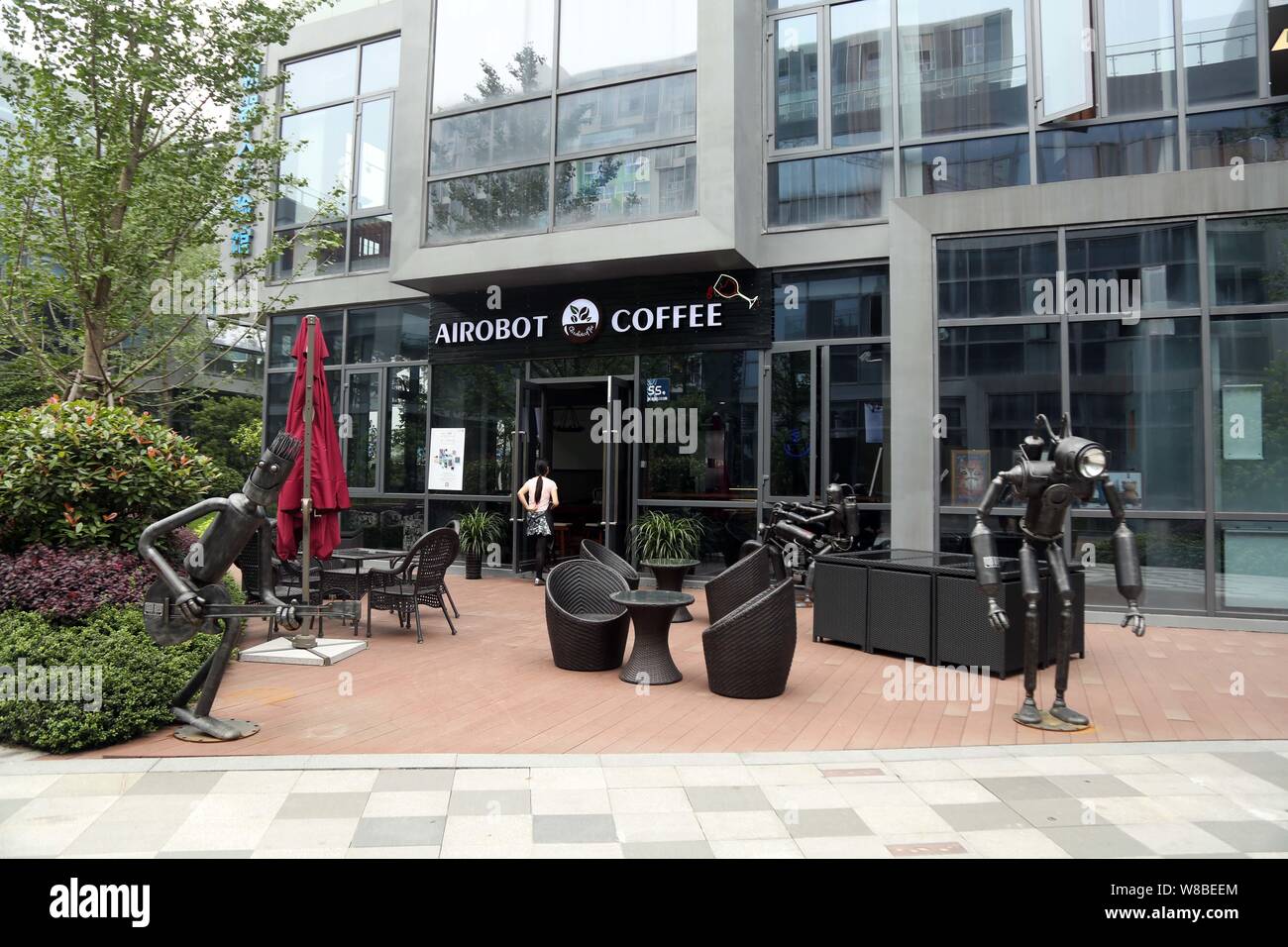 Robot-shaped sculptures are on display at the robot-themed cafe Airobot ...