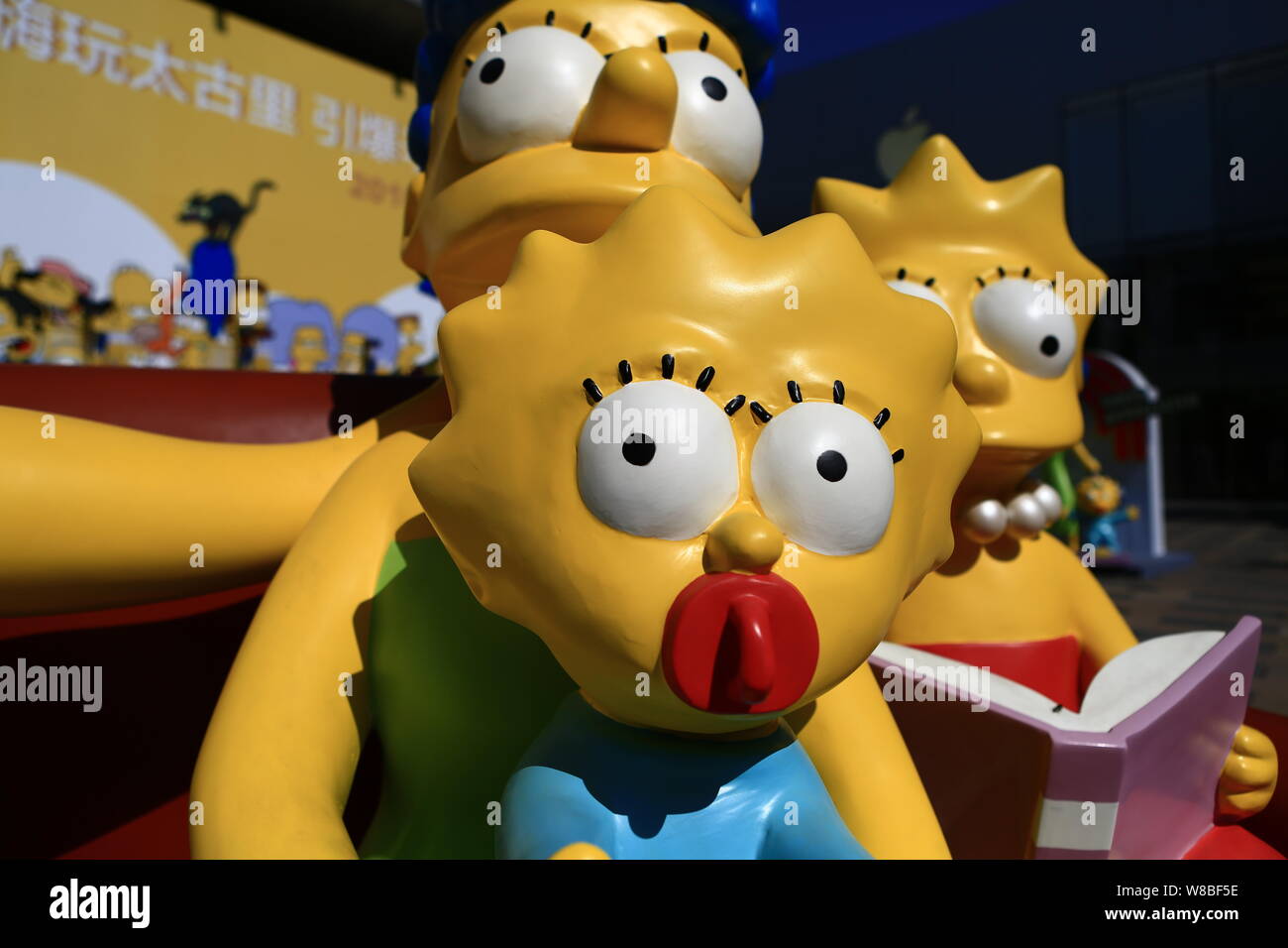 Model figures of The Simpsons are on display in front of The Simpsons ...