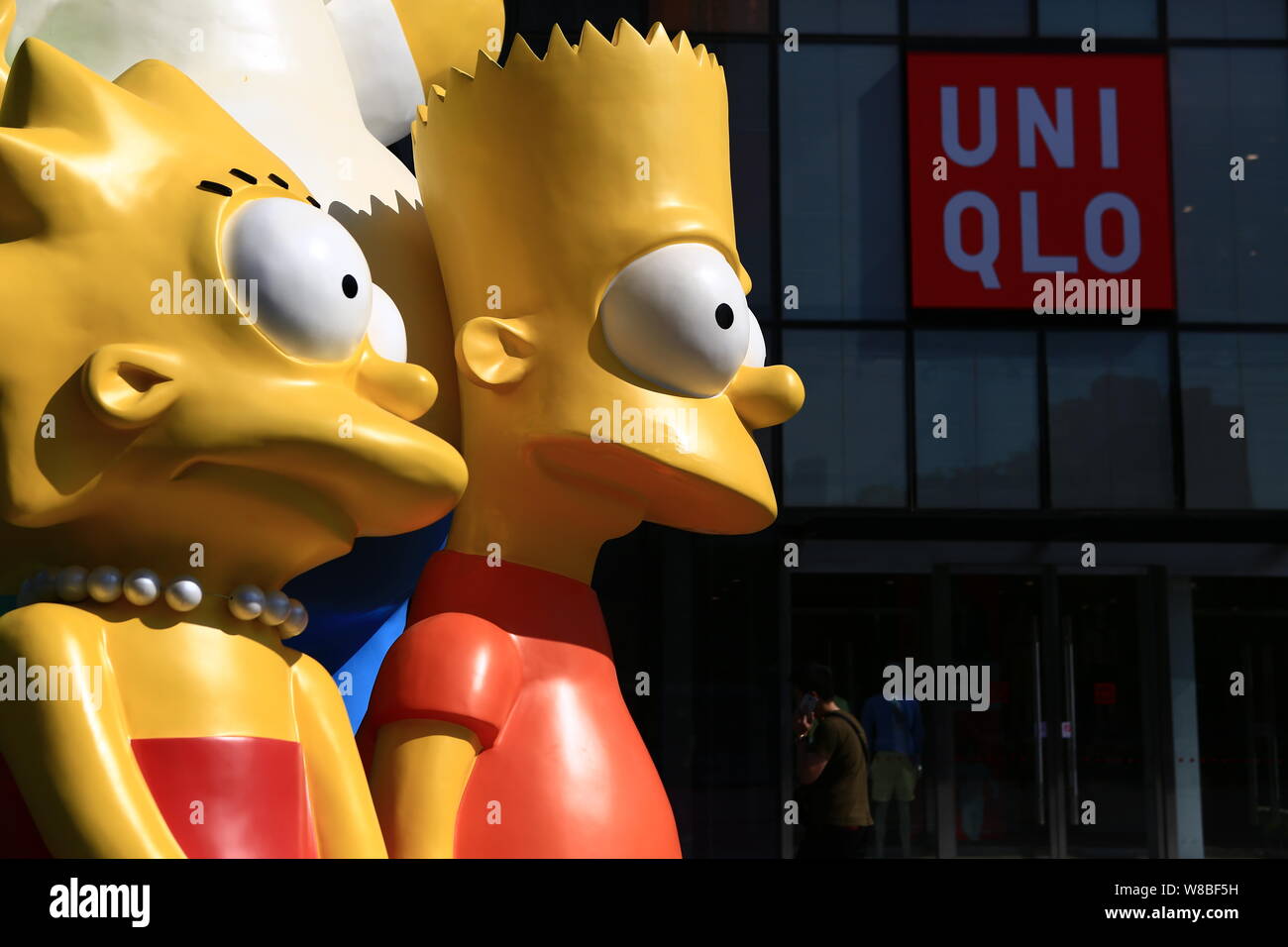 Model figures of The Simpsons are on display in front of The Simpsons ...
