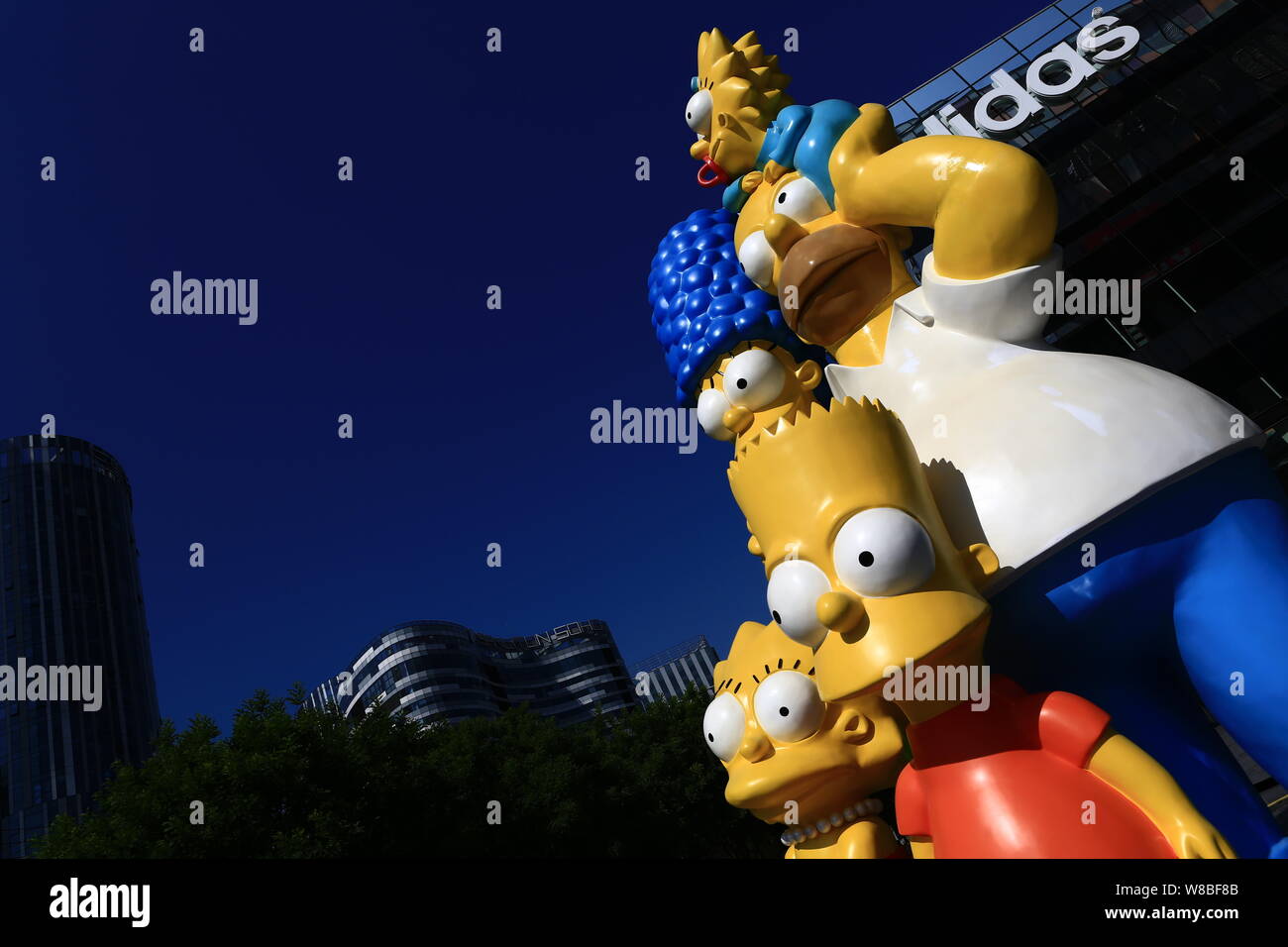 Model figures of The Simpsons are on display in front of The Simpsons ...