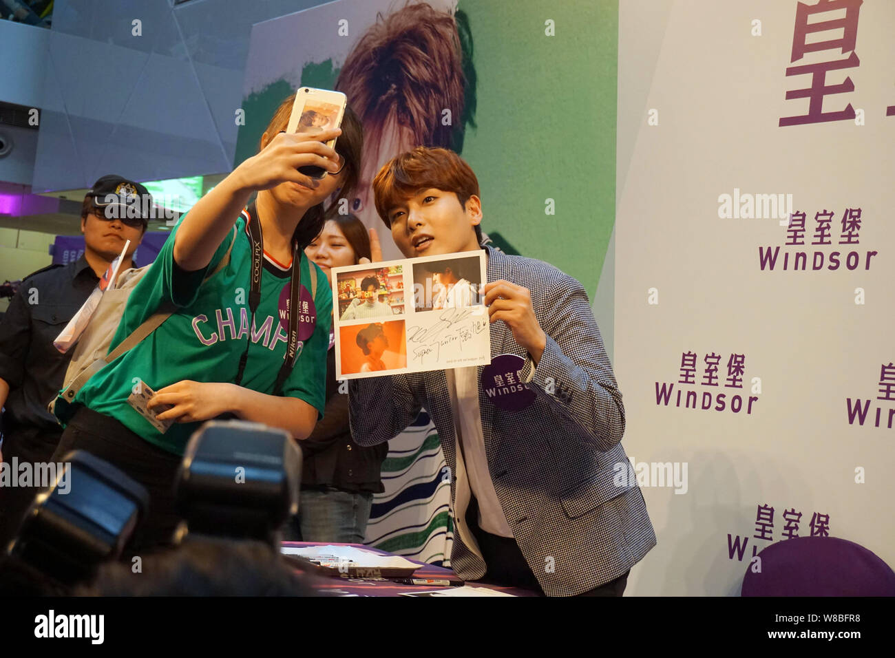 Singer and actor Kim Ryeo-wook, right, better known by the mononym ...