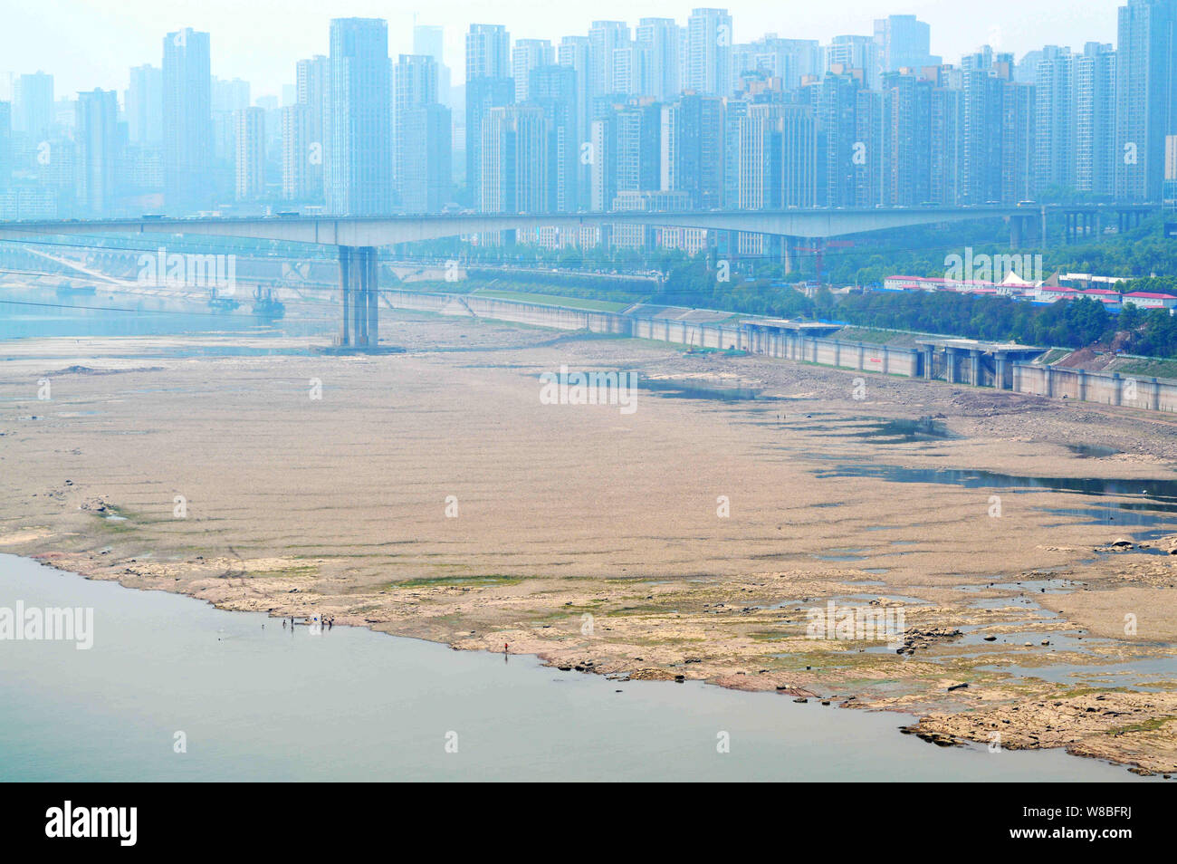 View of the exposed riverbed as water levels dropped on the ...