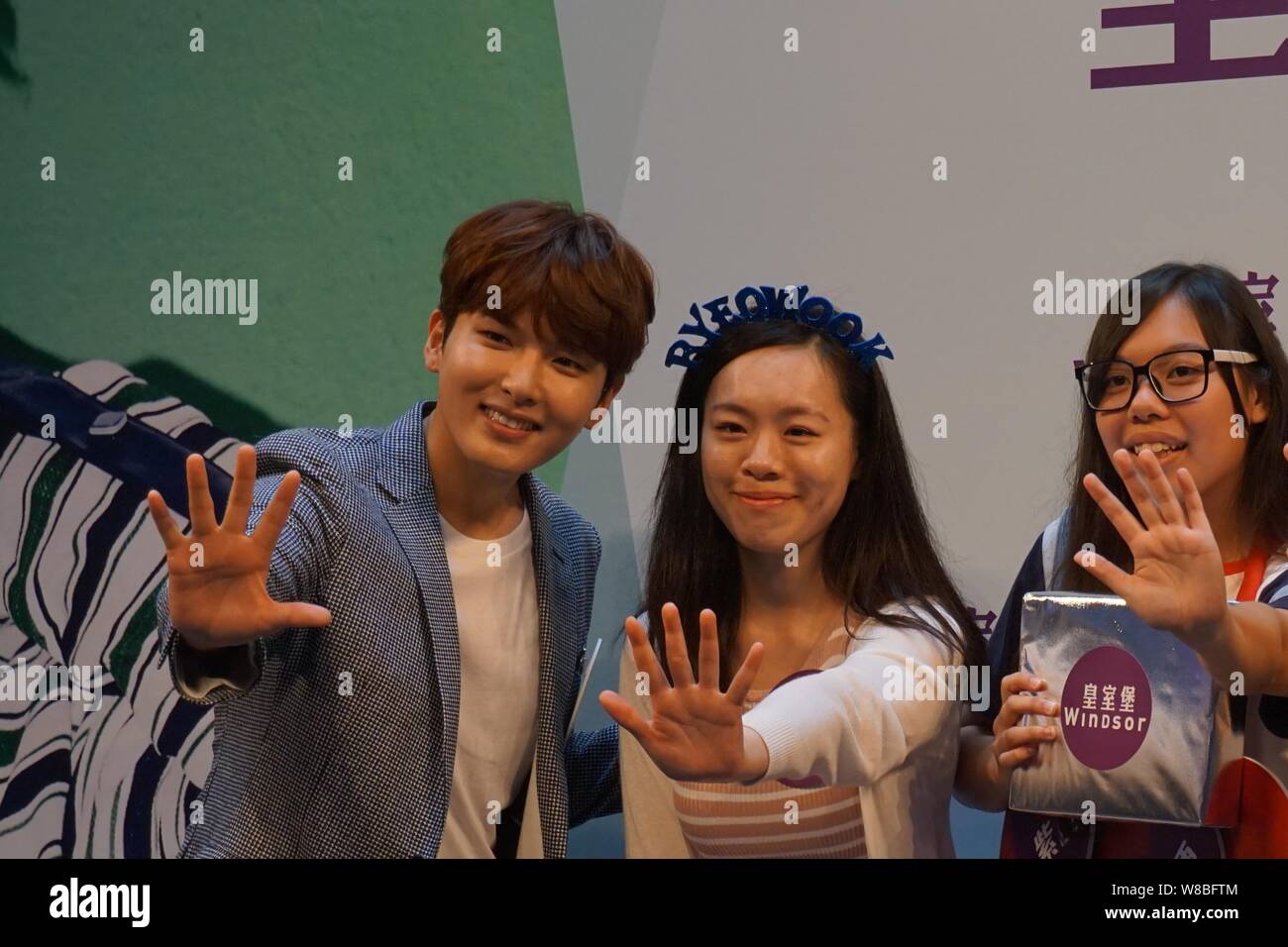 Singer and actor Kim Ryeo-wook, left, better known by the mononym ...