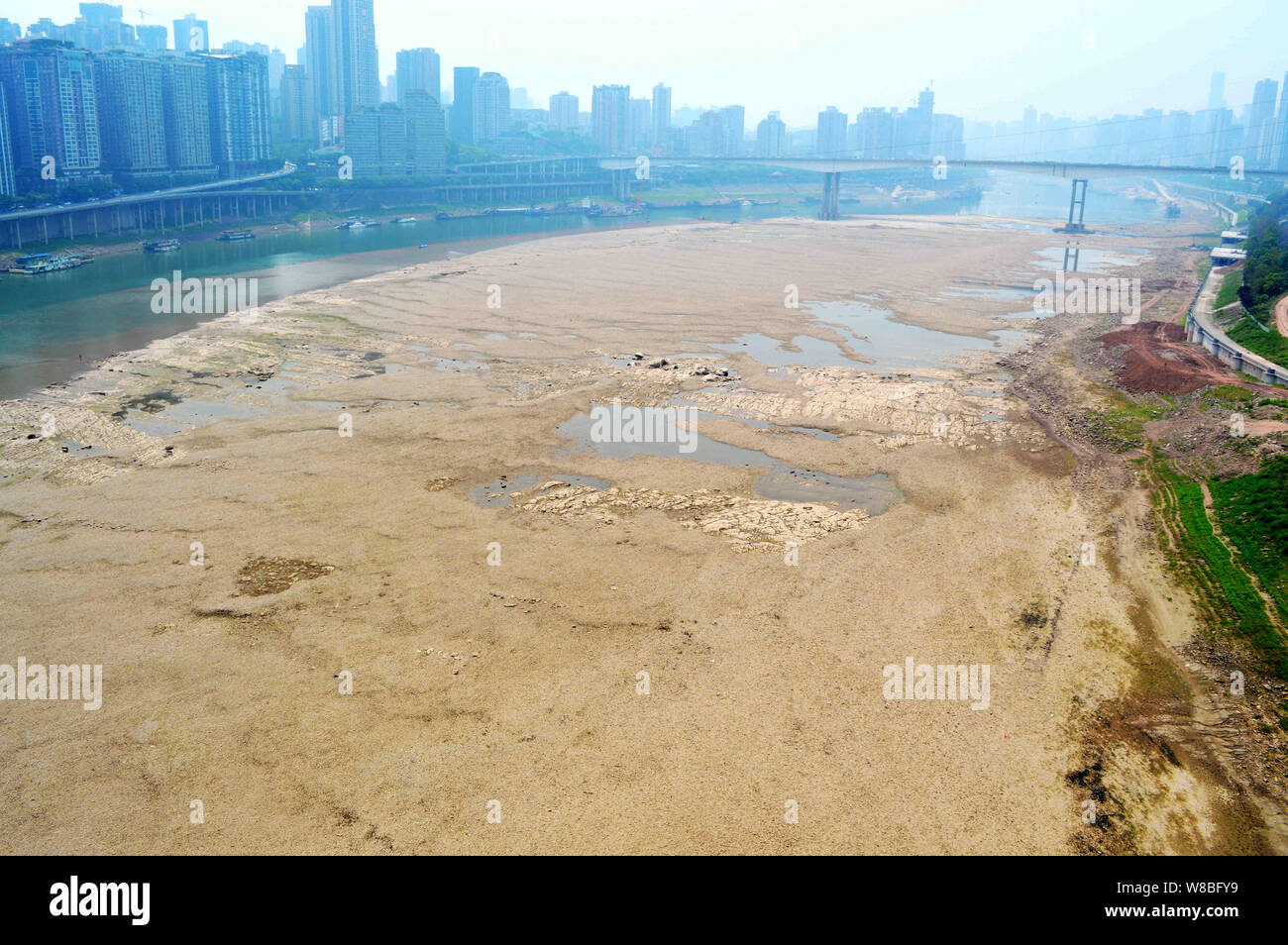 View of the exposed riverbed as water levels dropped on the ...