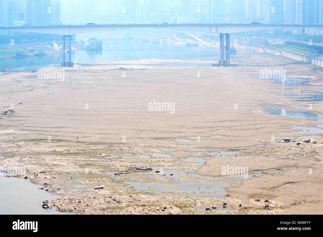 View of the exposed riverbed as water levels dropped on the ...