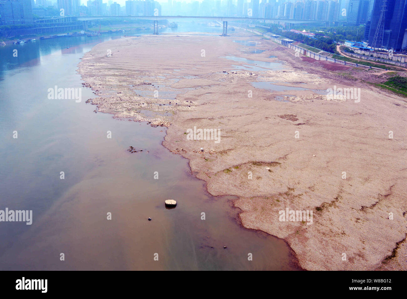 View of the exposed riverbed as water levels dropped on the ...
