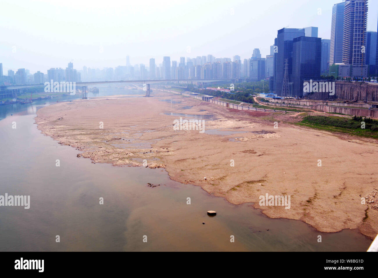 View of the exposed riverbed as water levels dropped on the ...