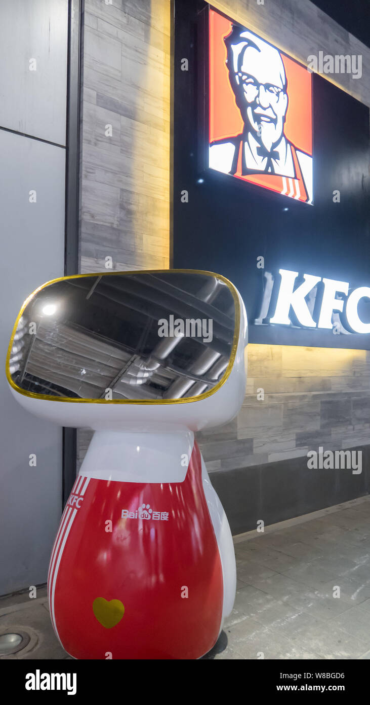 The AI robot "Dumi" is pictured in front of the 'Original+' concept ...