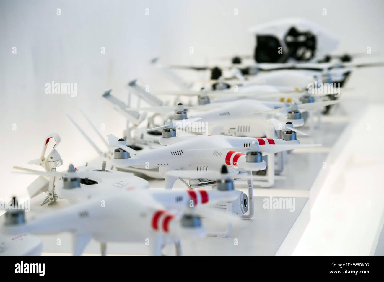 Drones are on display at the headquarters of DJI in Shenzhen city ...
