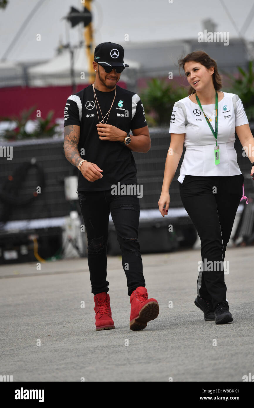 British F1 driver Lewis Hamilton of Mercedes, left, is pictured at a ...