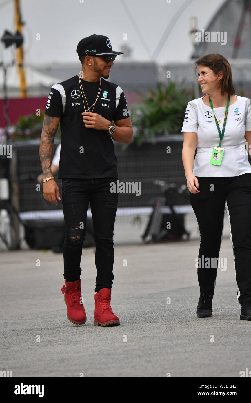 British F1 driver Lewis Hamilton of Mercedes, left, is pictured at a ...
