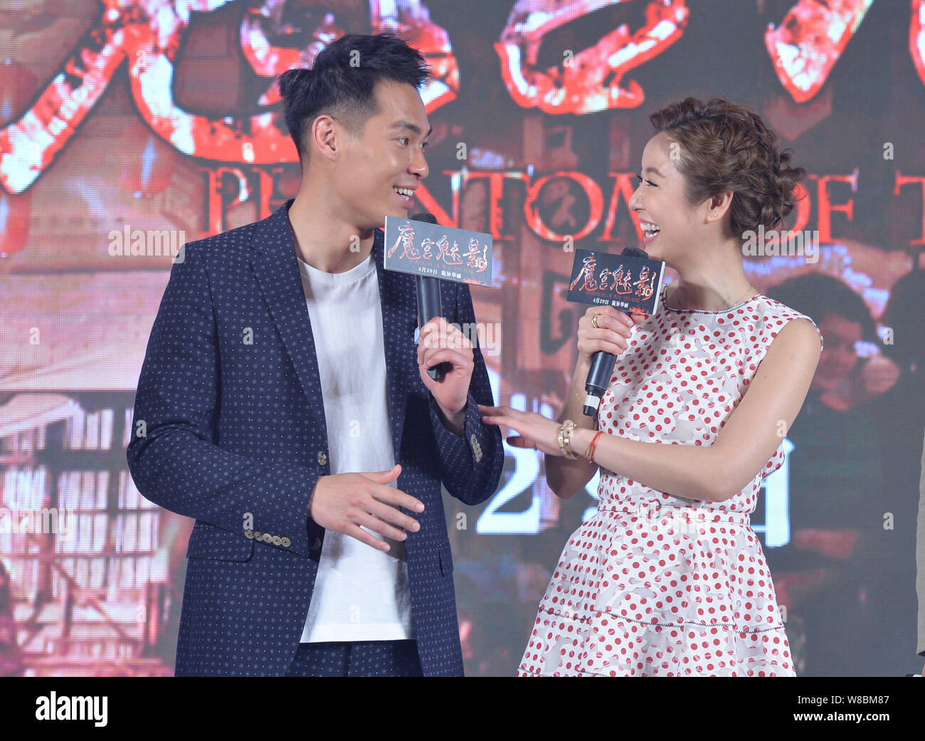 Taiwanese actress Ruby Lin, right, and actor Tony Yeung attend a press ...
