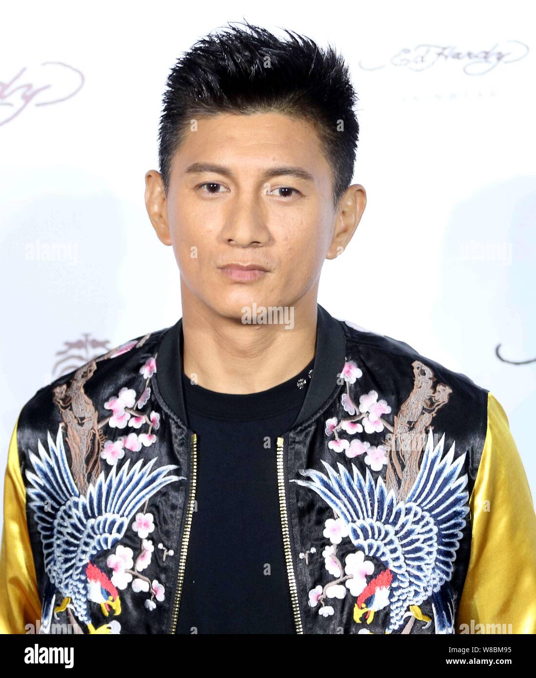 Taiwanese actor Nicky Wu arrives for a fashion show of Ed Hardy ...