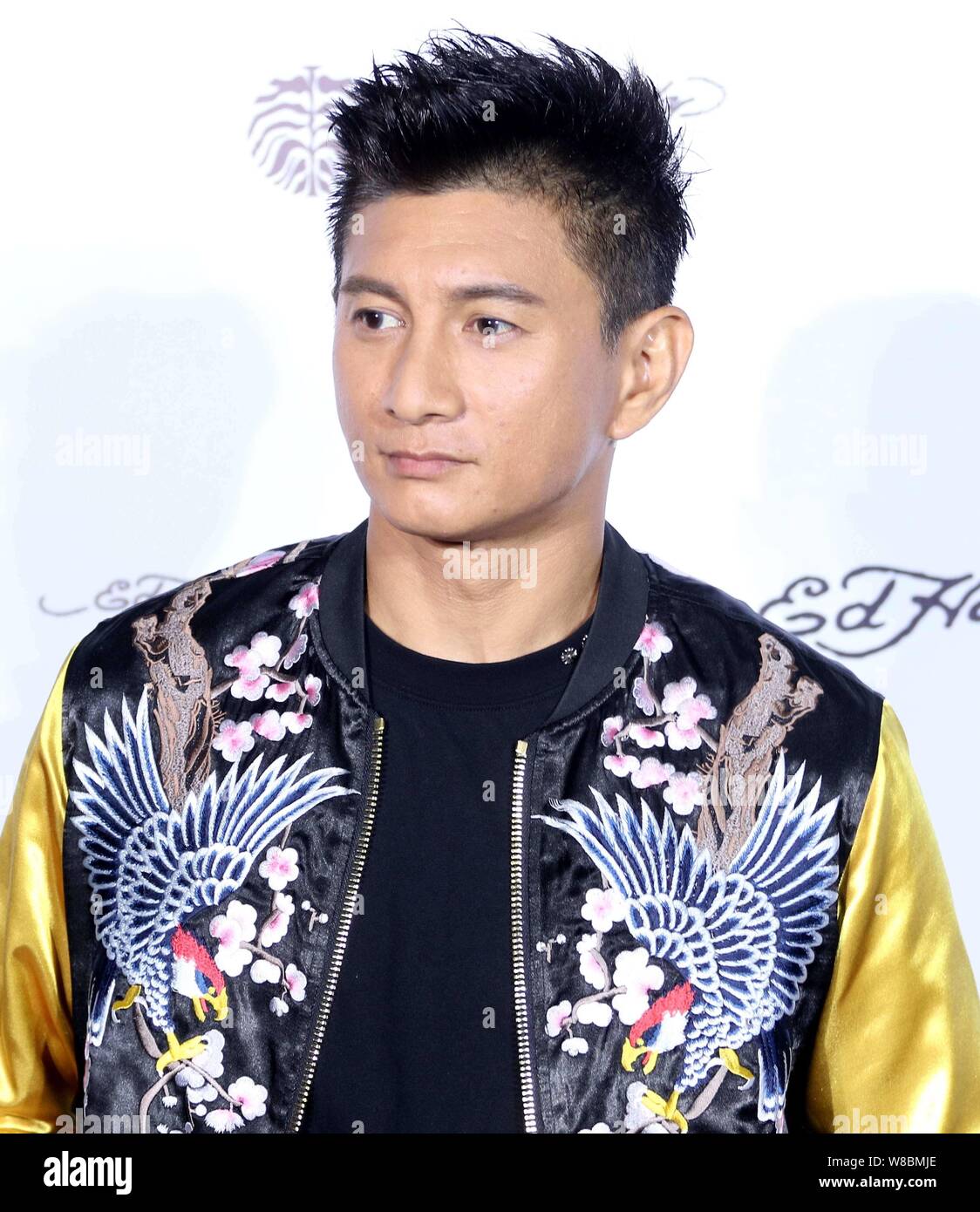 Taiwanese actor Nicky Wu arrives for a fashion show of Ed Hardy ...