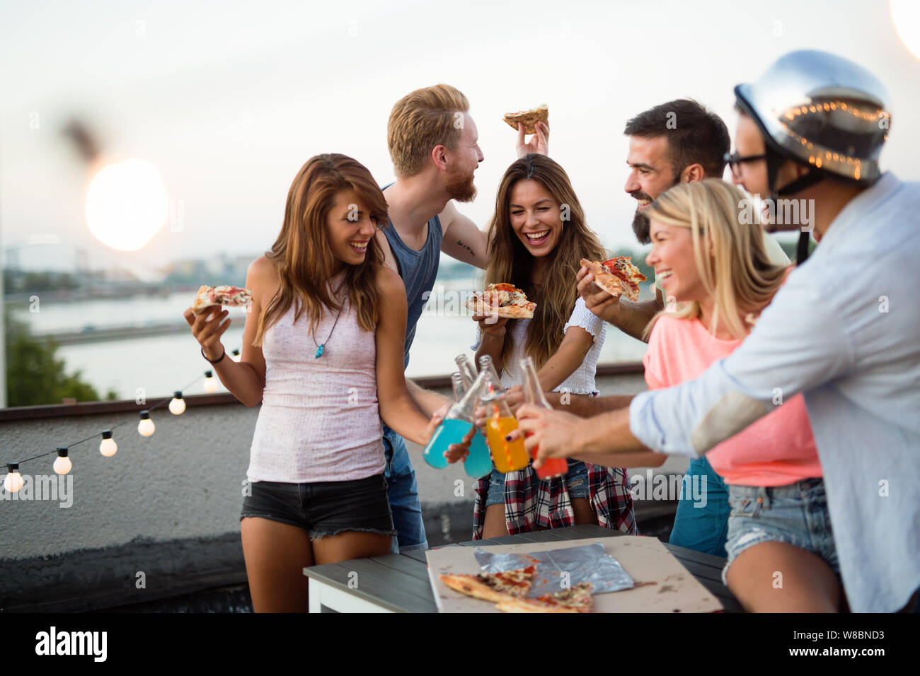 Happy group of young friends having fun in summer Stock Photo - Alamy