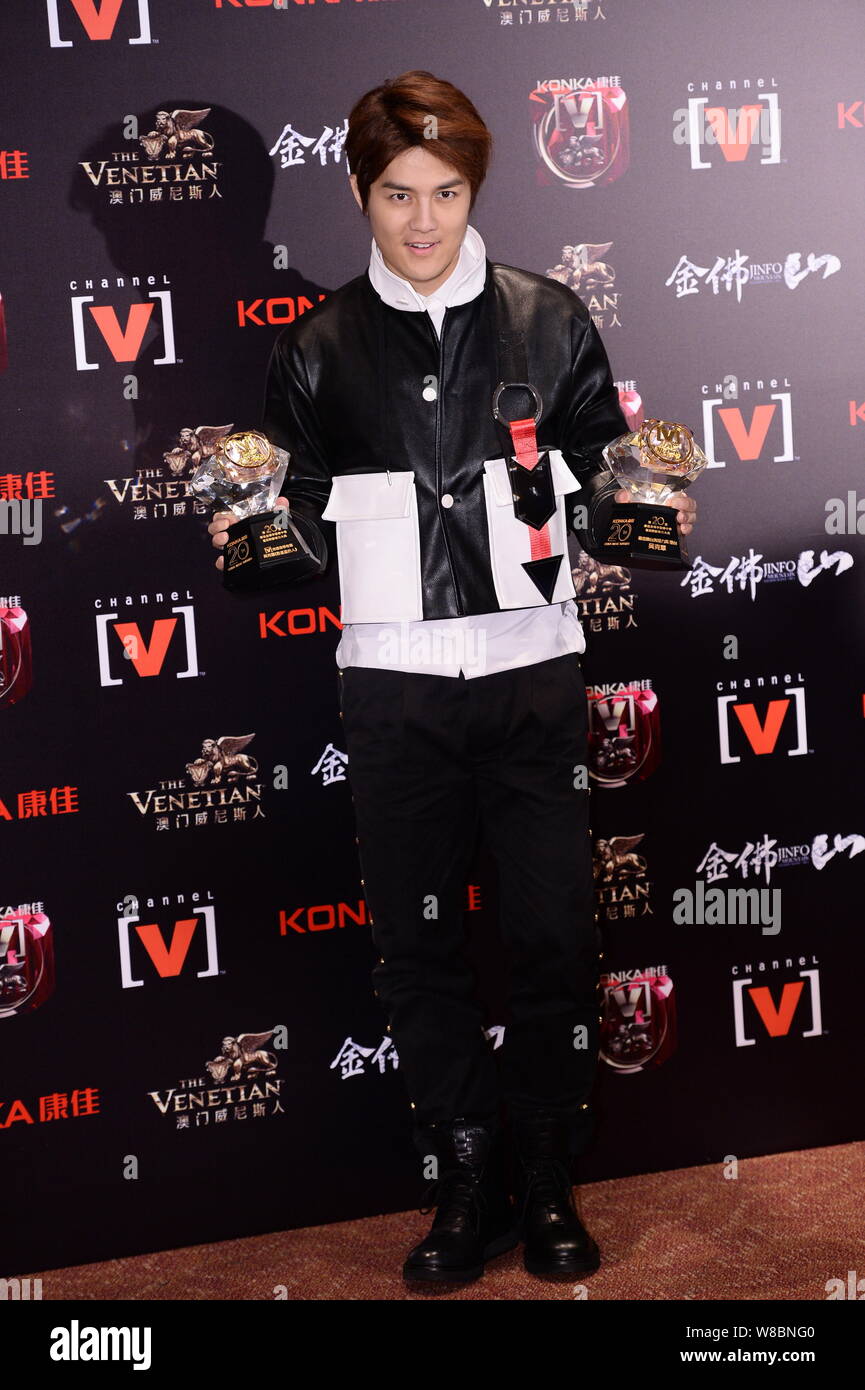 Taiwanese singer Kenji Wu poses with his trophies after the 20th China ...