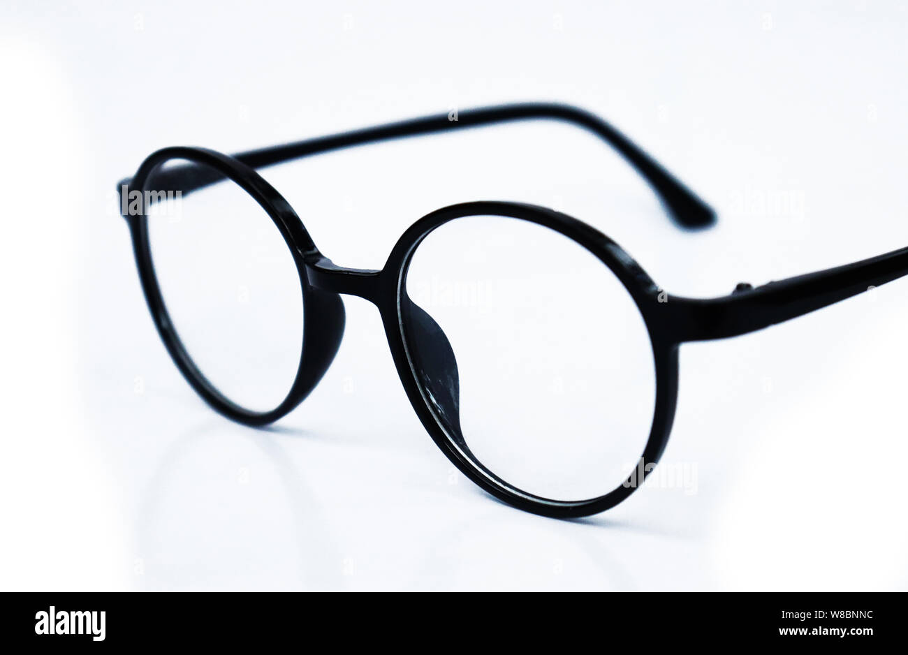 Black frame glasses hi-res stock photography and images - Alamy