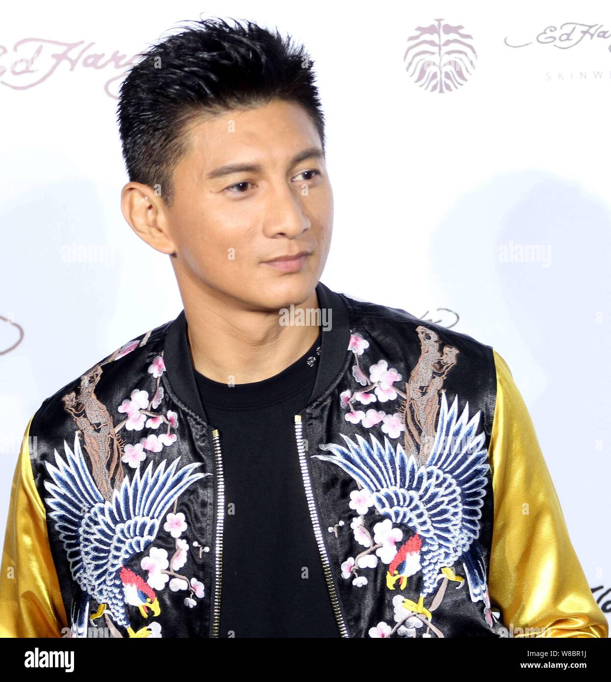 Taiwanese actor Nicky Wu arrives for a fashion show of Ed Hardy ...
