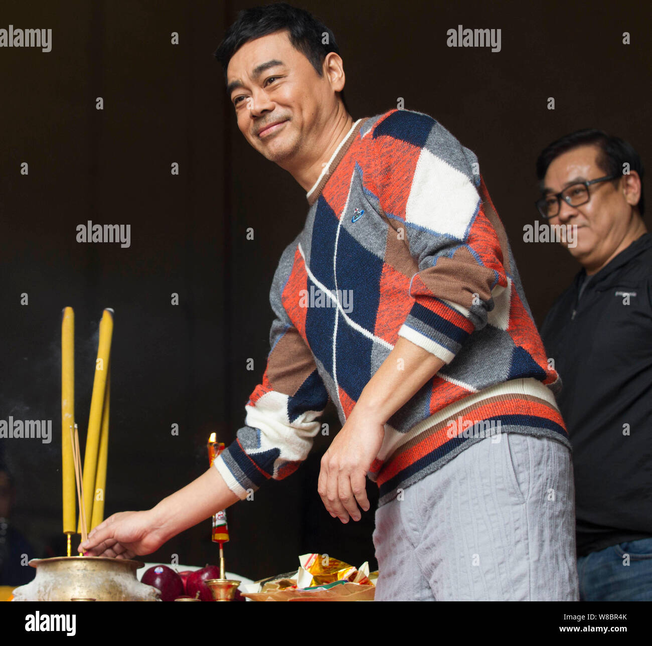 Hong Kong actor Sean Lau attends the worshipping ceremony for the 35th ...