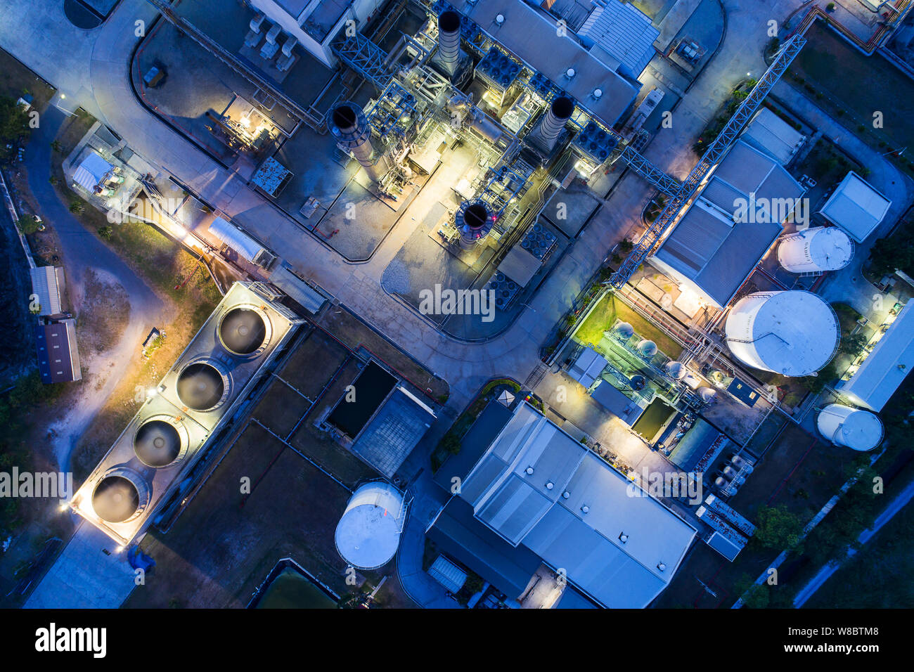 Aerial view night light oil terminal is industrial facility for storage ...