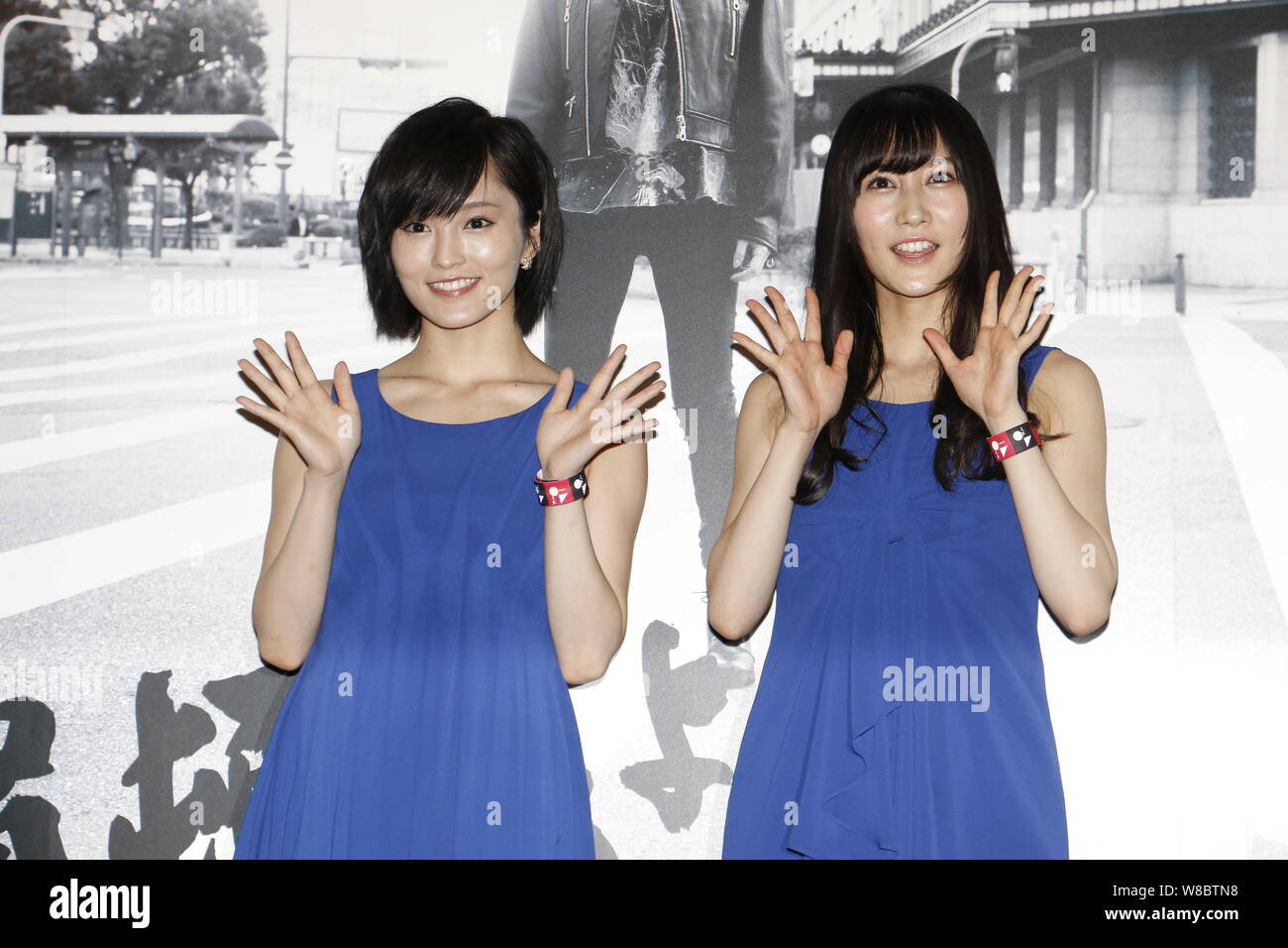 Yamamoto Sayaka, left, and Yagura Fuuko of Japanese girl group NMB48 pose at a promotional event ...