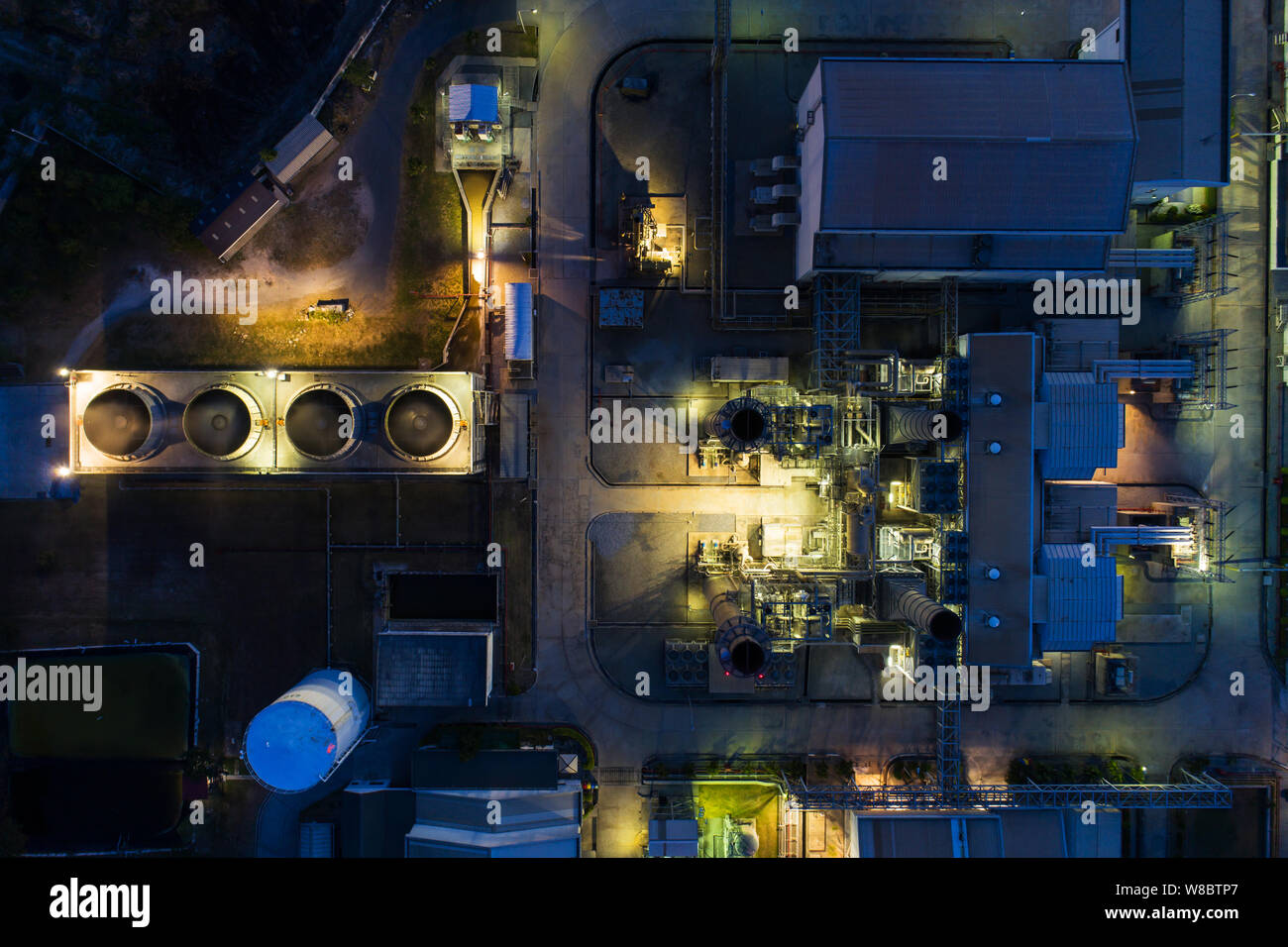 Aerial view night light oil terminal is industrial facility for storage ...