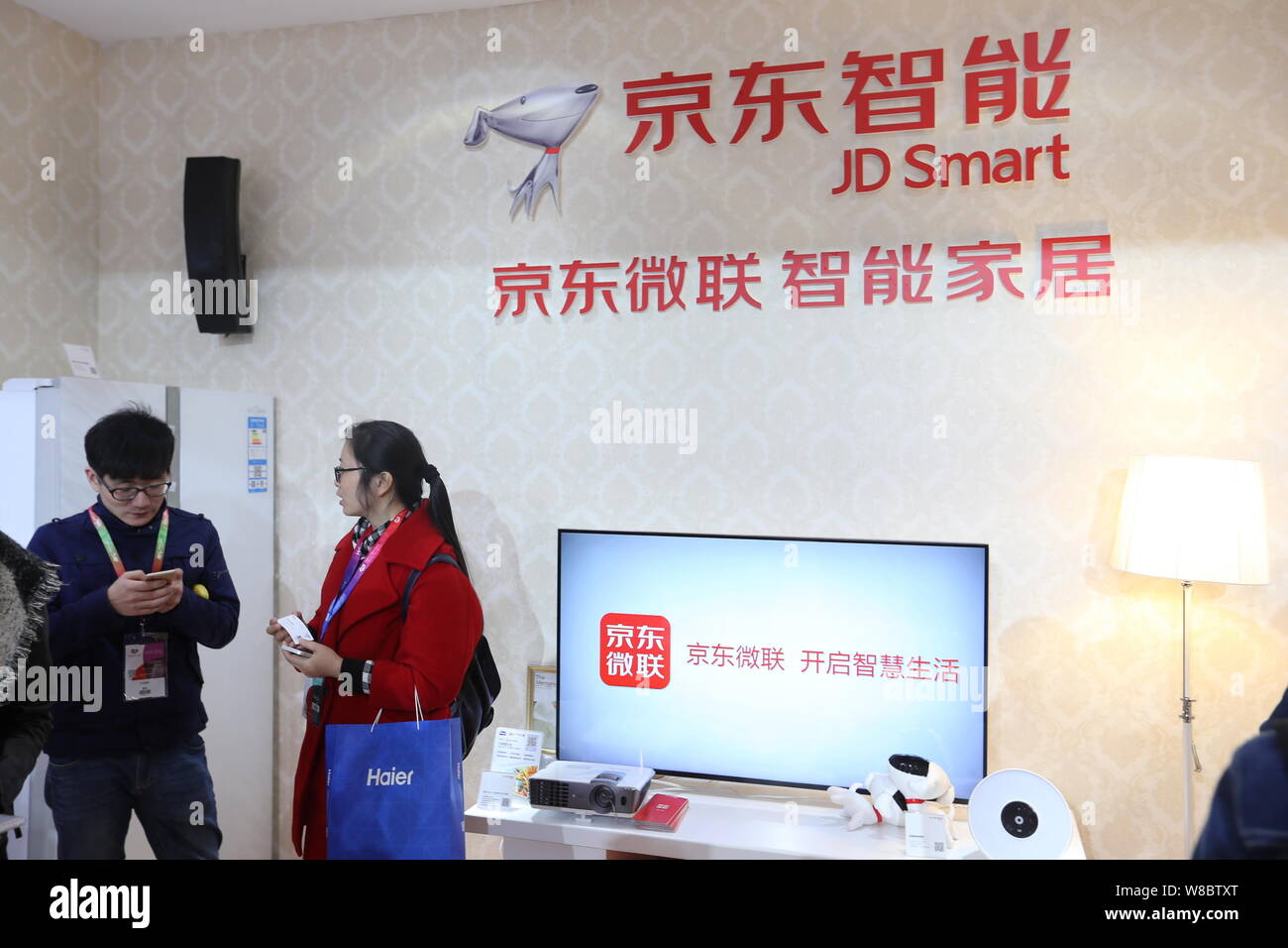 --FILE--People visit the stand of JD Smart of Chinese online retailer ...