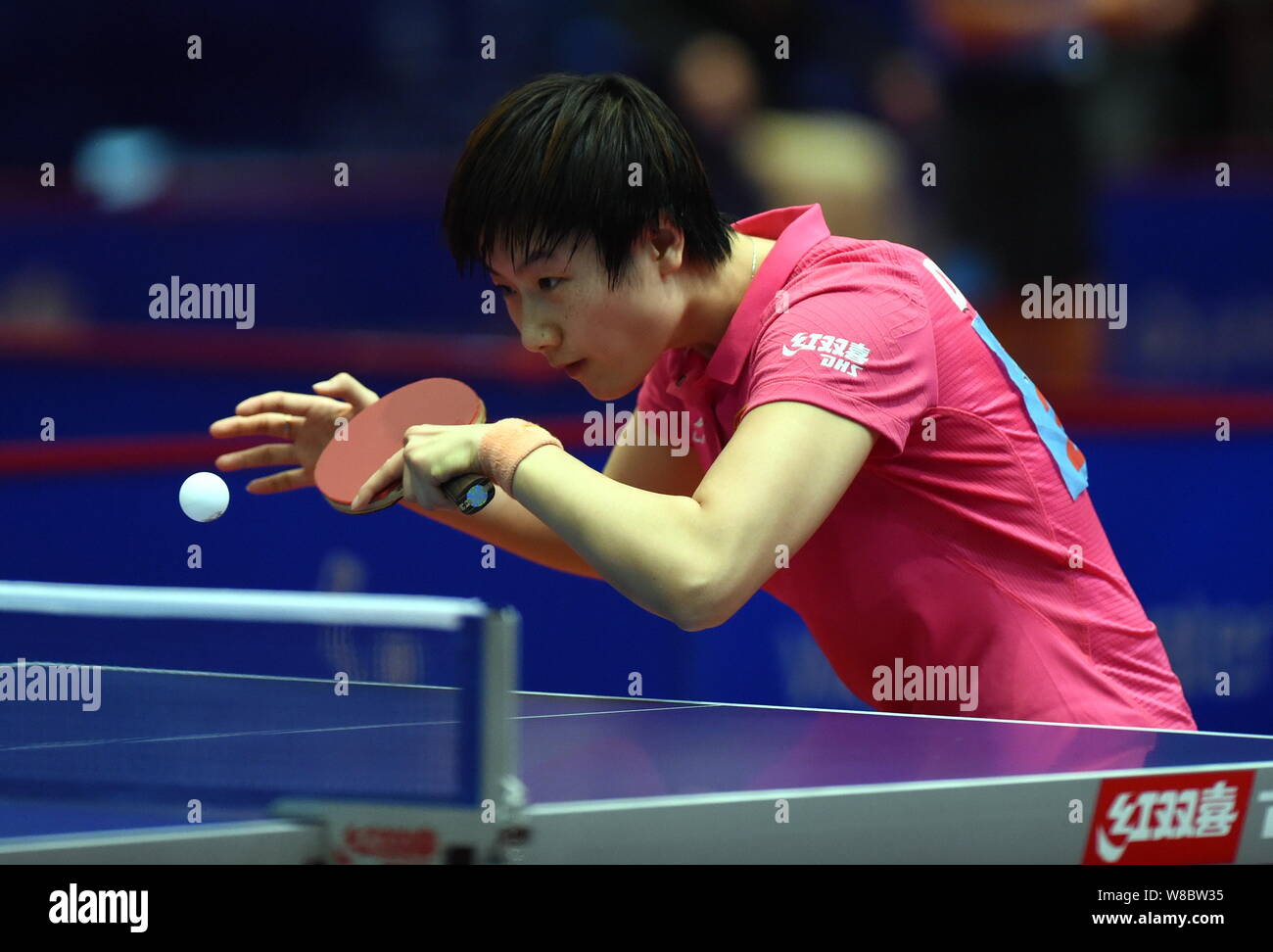 Ding Ning of China returns a shot to Mima Ito of Japan in their Women's ...