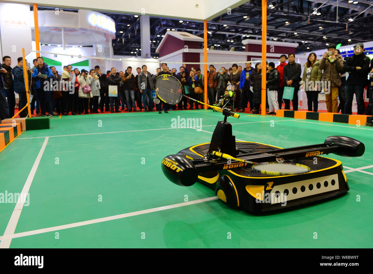 --FILE--The badminton robot Robomintoner plays badminton against a ...