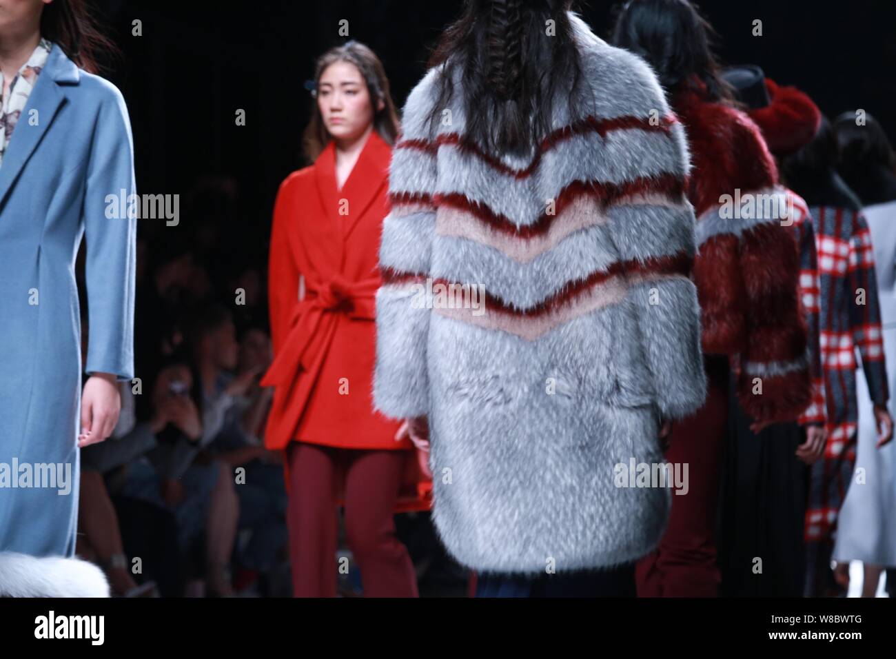 Models display new creations by Chinese designer Alicia Lee at a ...