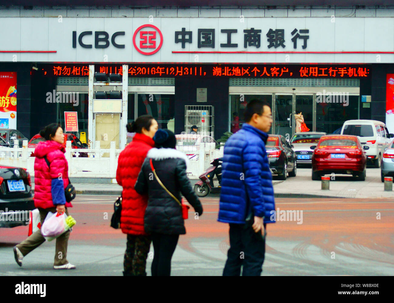 --FILE--Pedestrians walk past a branch of ICBC (Industrial and ...