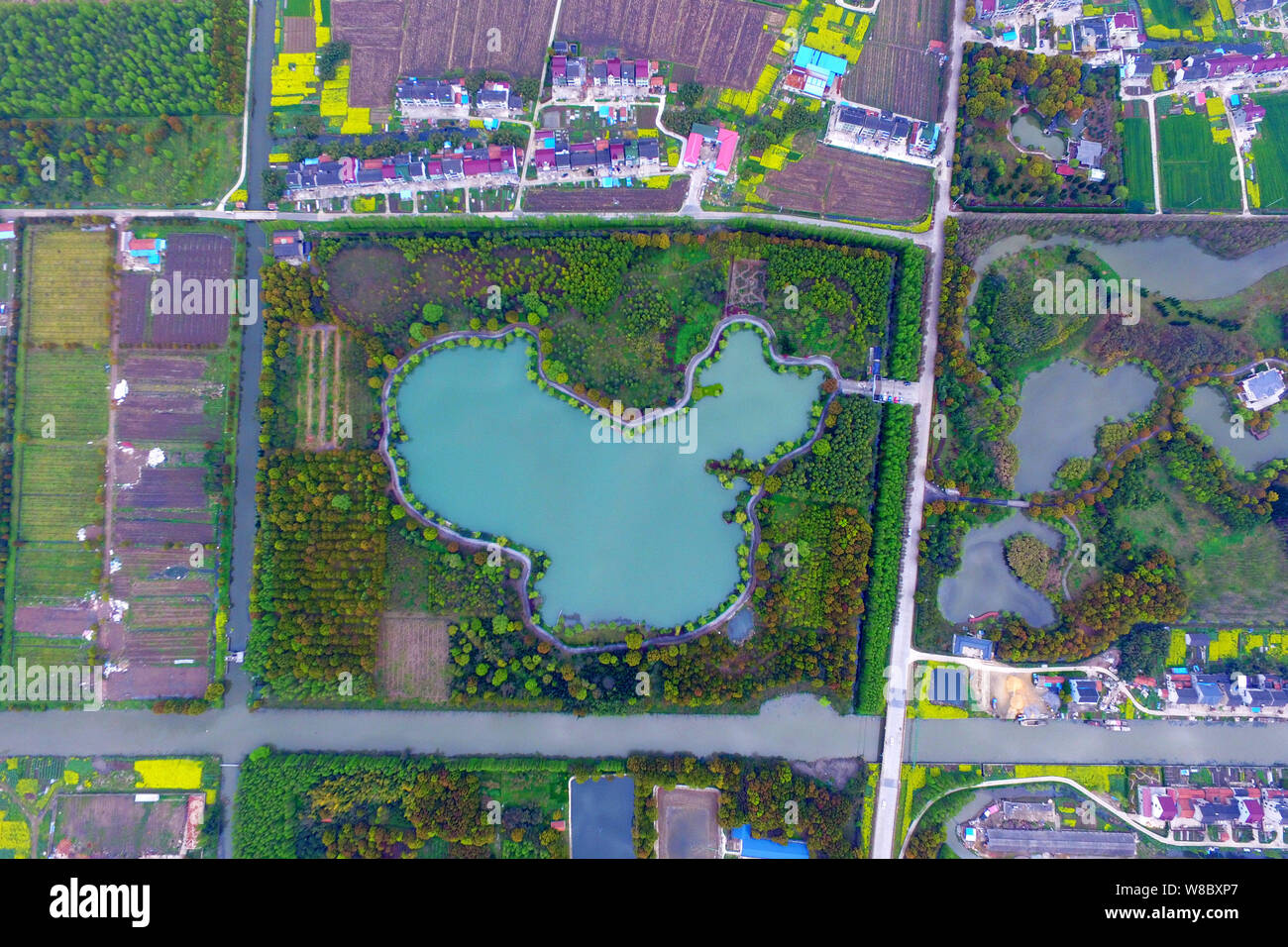 Aerial view of an artificial lake resembling China's map in Baiyang ...