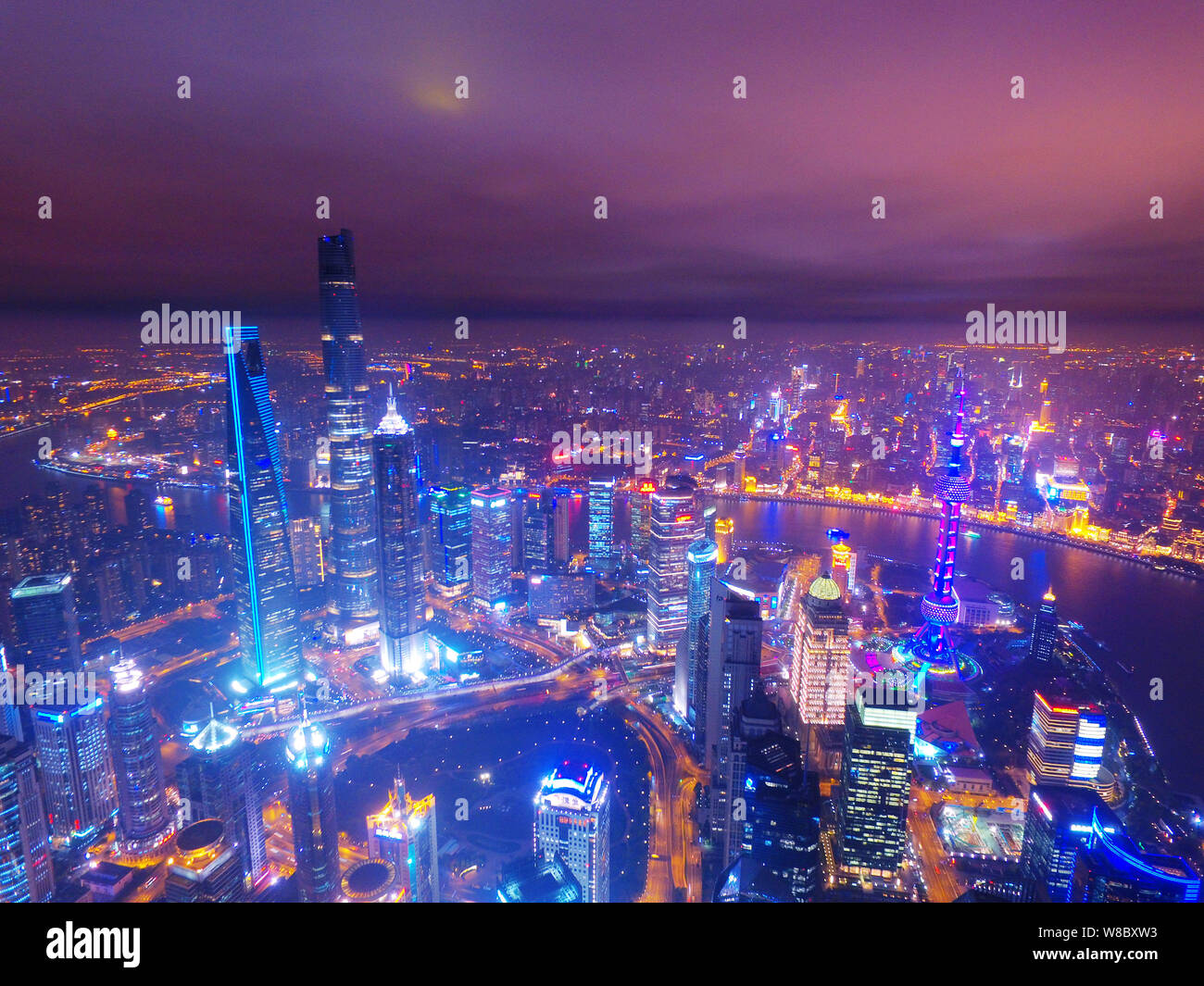 Night view of the Lujiazui Financial District with the Shanghai Tower ...