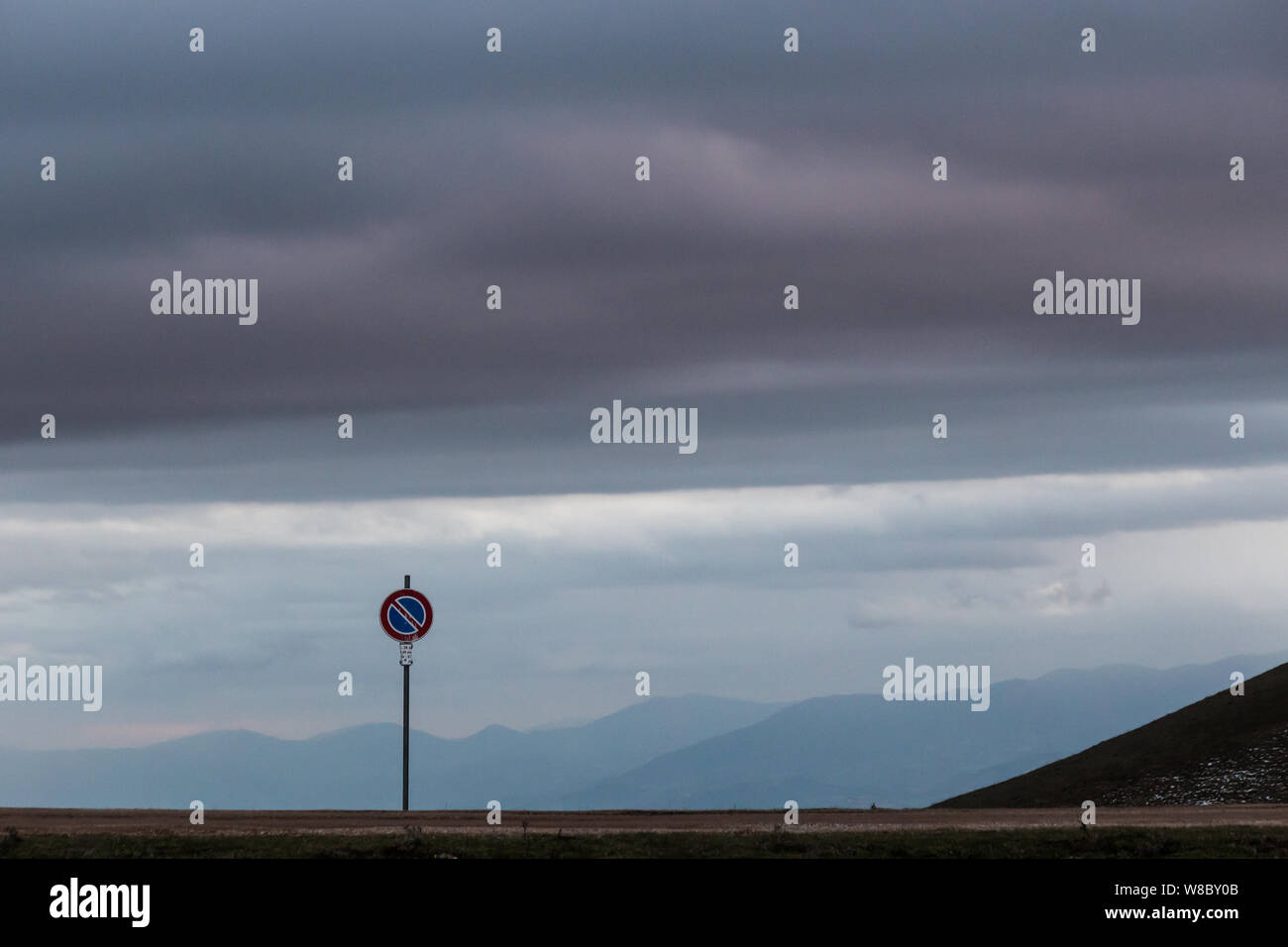 Road sign against a moody sky background with big clouds Stock Photo ...