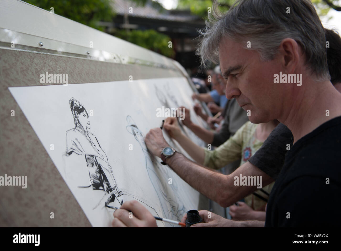 Foreign cartoonists draw pictures showing their impressions of Beijing ...