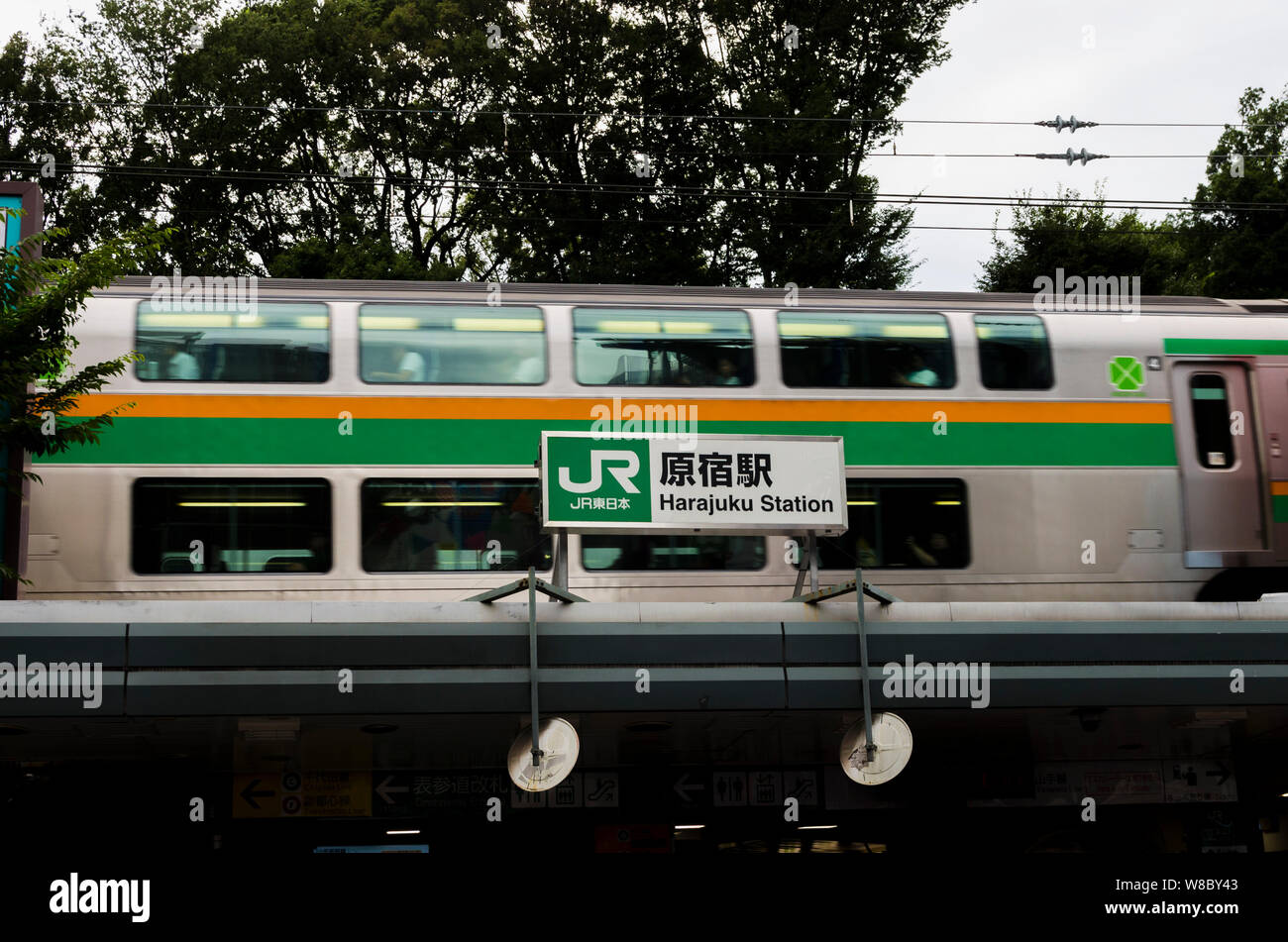 Picture of Jr train behind the sign of a Harajuku train sign Stock ...