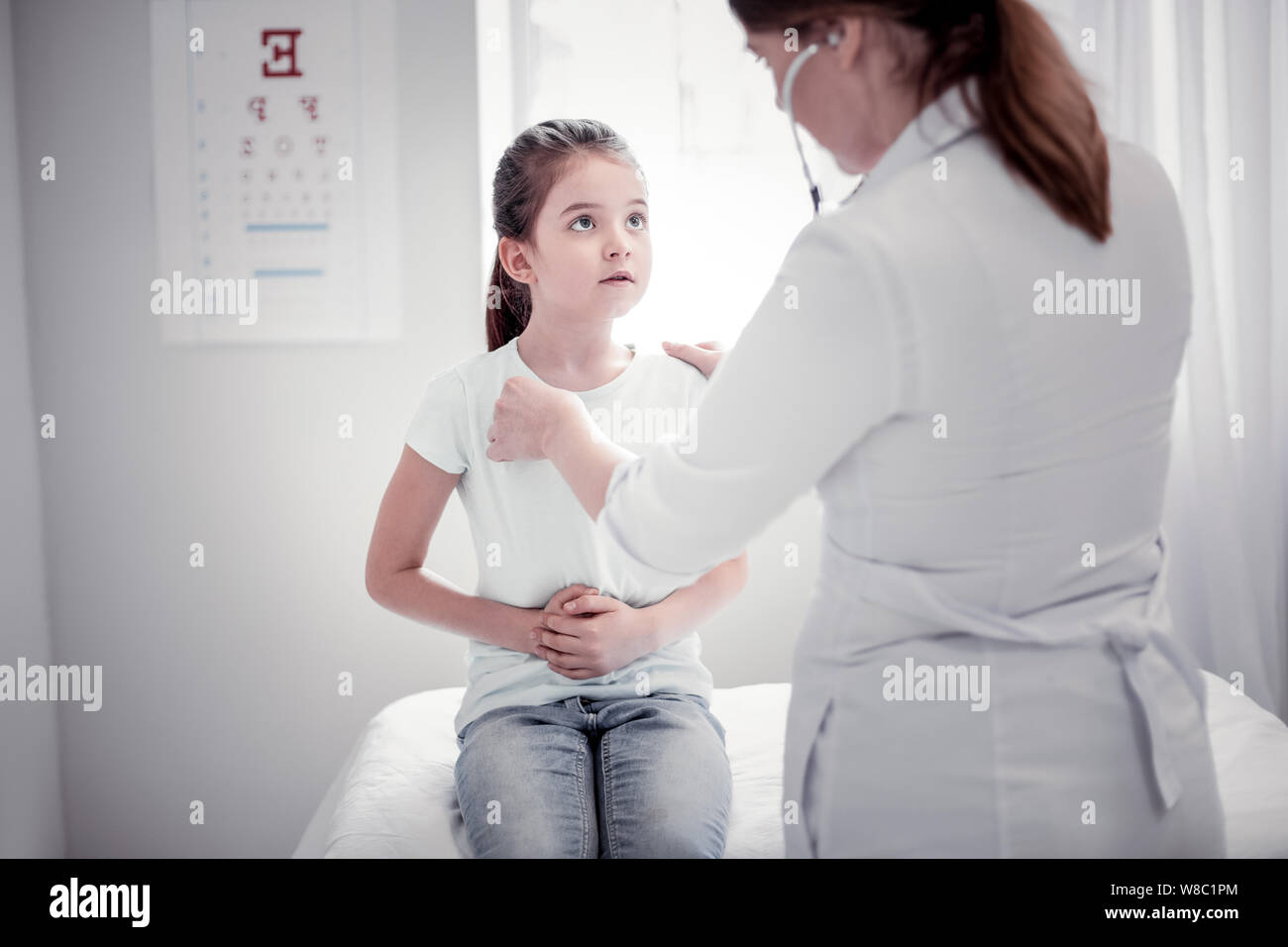Girl having medical examination hi-res stock photography and images - Alamy