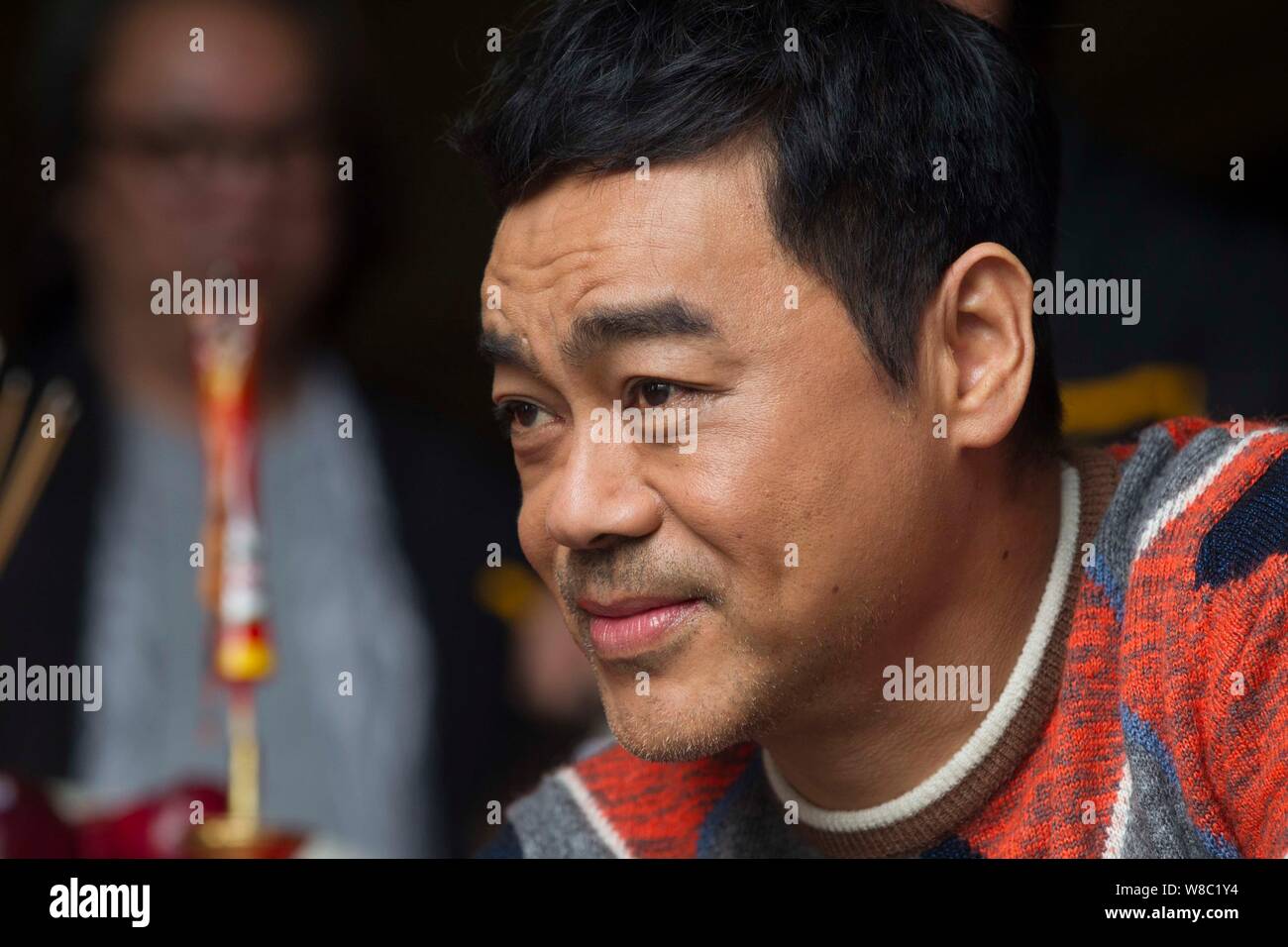 Hong Kong actor Sean Lau attends the worshipping ceremony for the 35th ...
