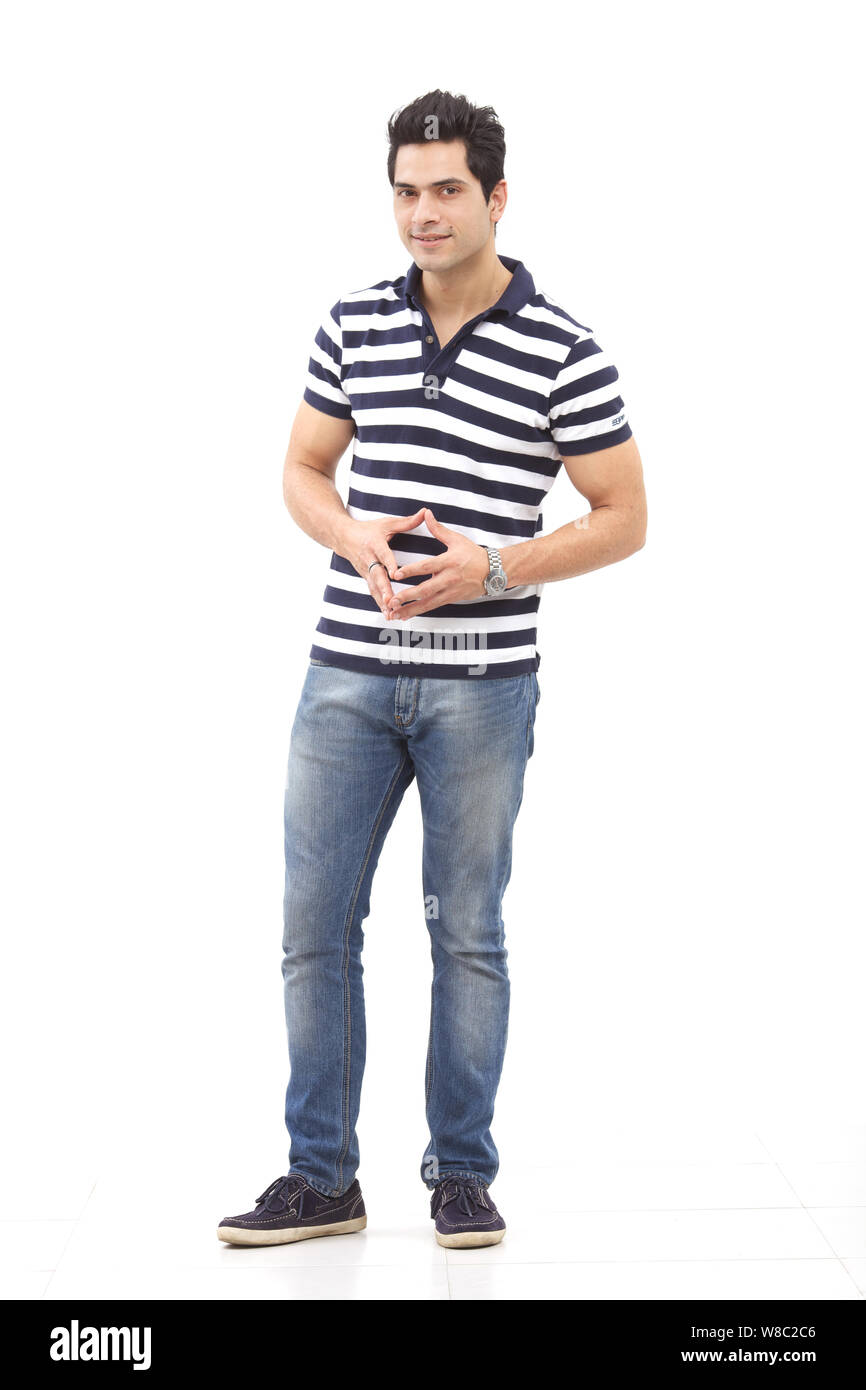 Young man posing Stock Photo - Alamy