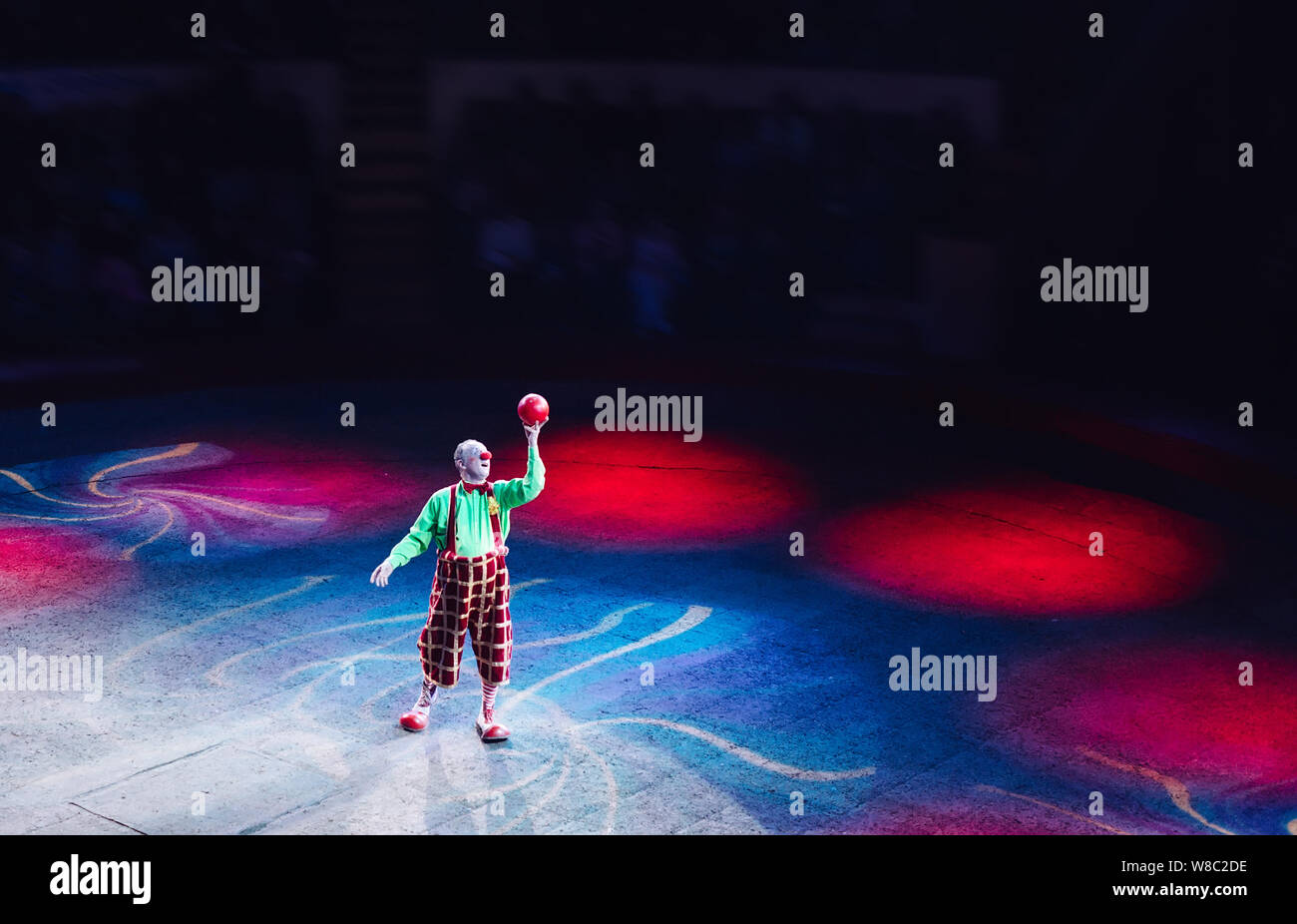 Performance of a Clown with a ball at the Circus Stock Photo - Alamy